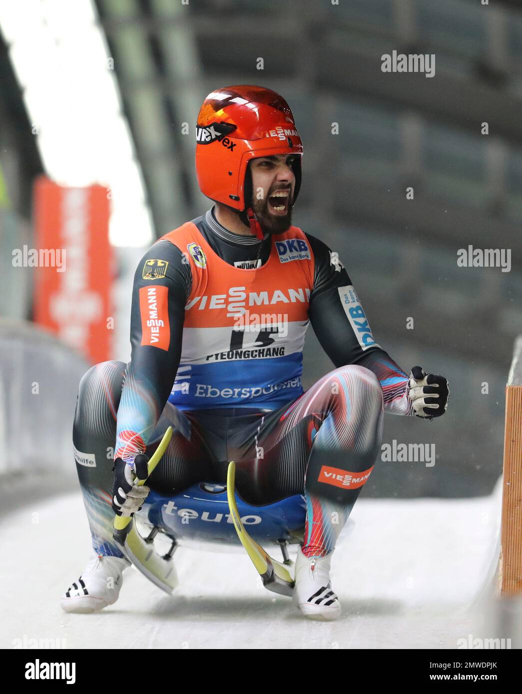 Second placed Germany's Andi Langenhan reacts in the finish area during ...