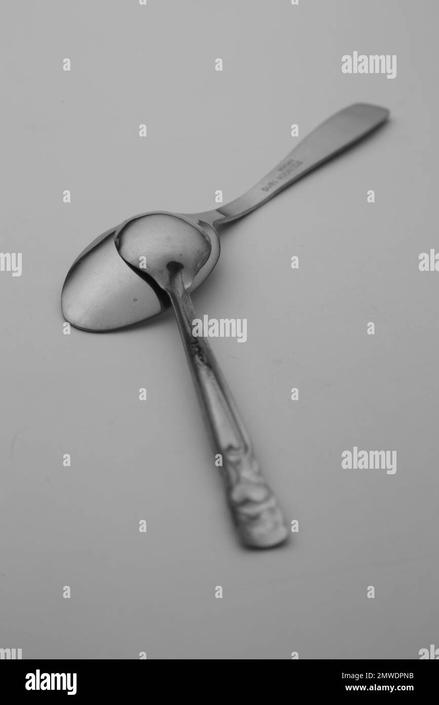 A vertical of the silver spoon, forks, and knife cutlery isolated on ...