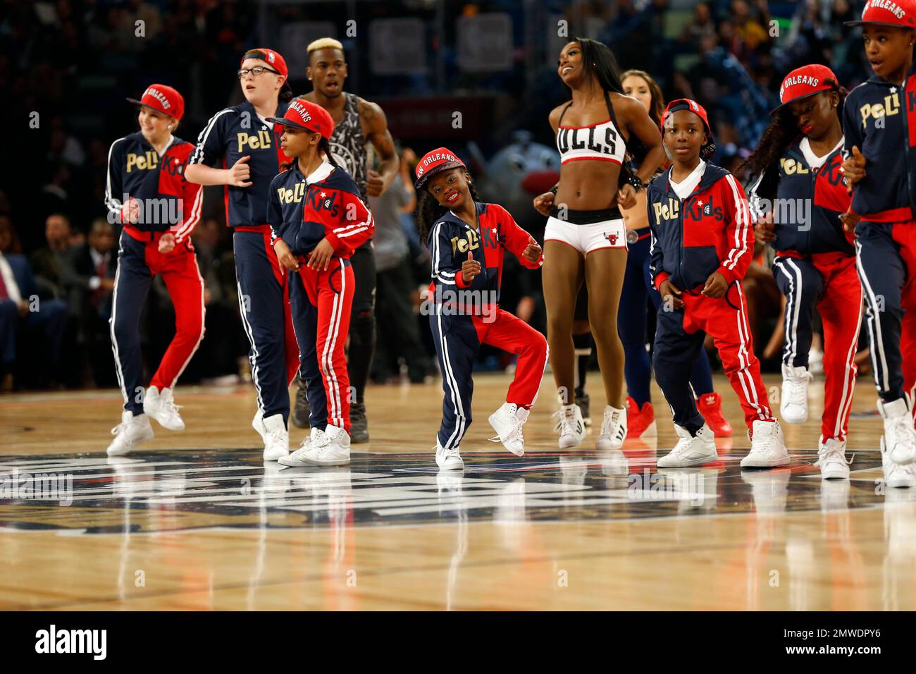 NBA cheerleaders perform with the Junior Pelicans dance team during NBA ...