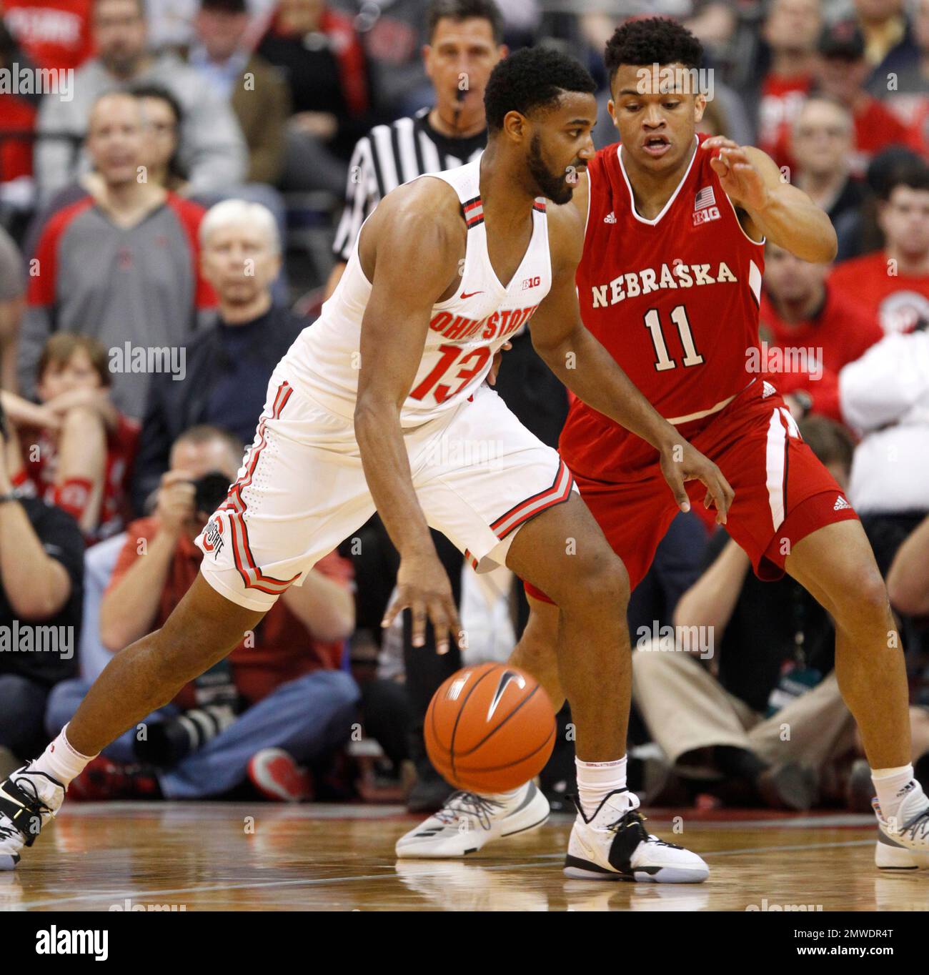Ohio State guard JaQuan Lyle, left, drives against Nebraska guard Evan ...