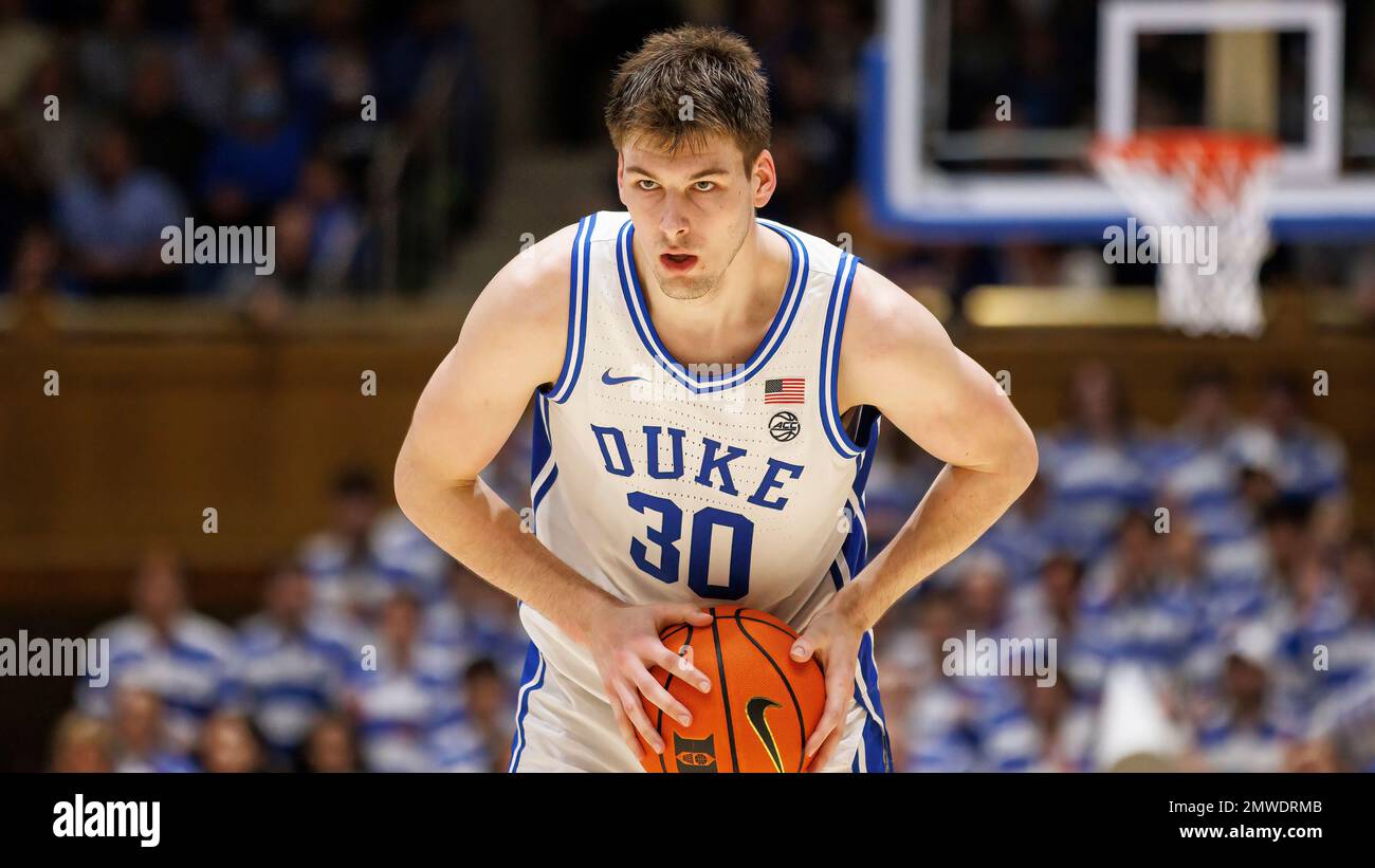 Duke's Kyle Filipowski (30) handles the ball during an NCAA college ...