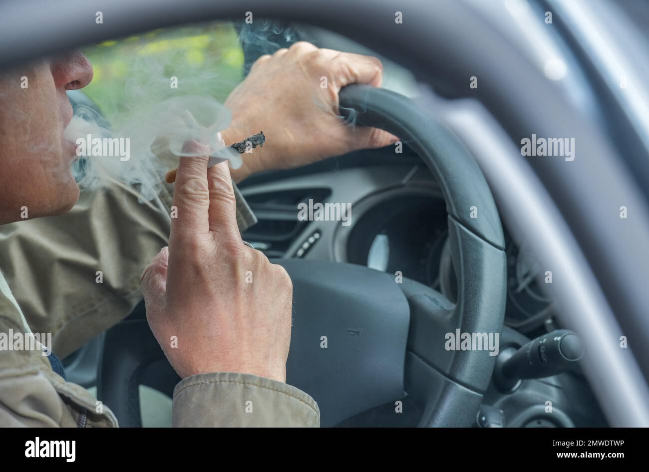 Smoking, Cigarette, Car, Symbol photo Stock Photo - Alamy