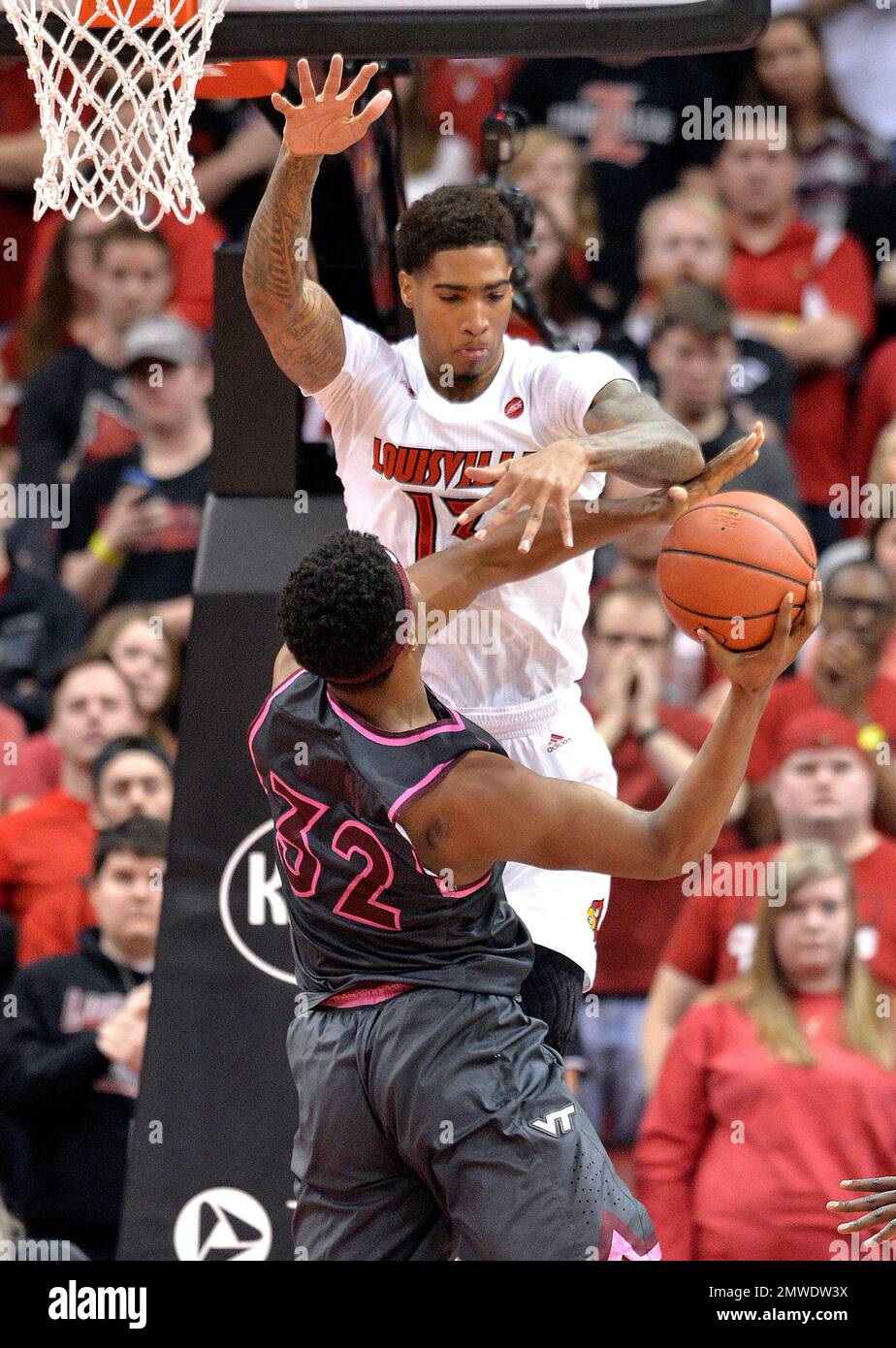Louisville's Ray Spalding (13) fouls Virginia Tech's Zach LeDay (32) as ...