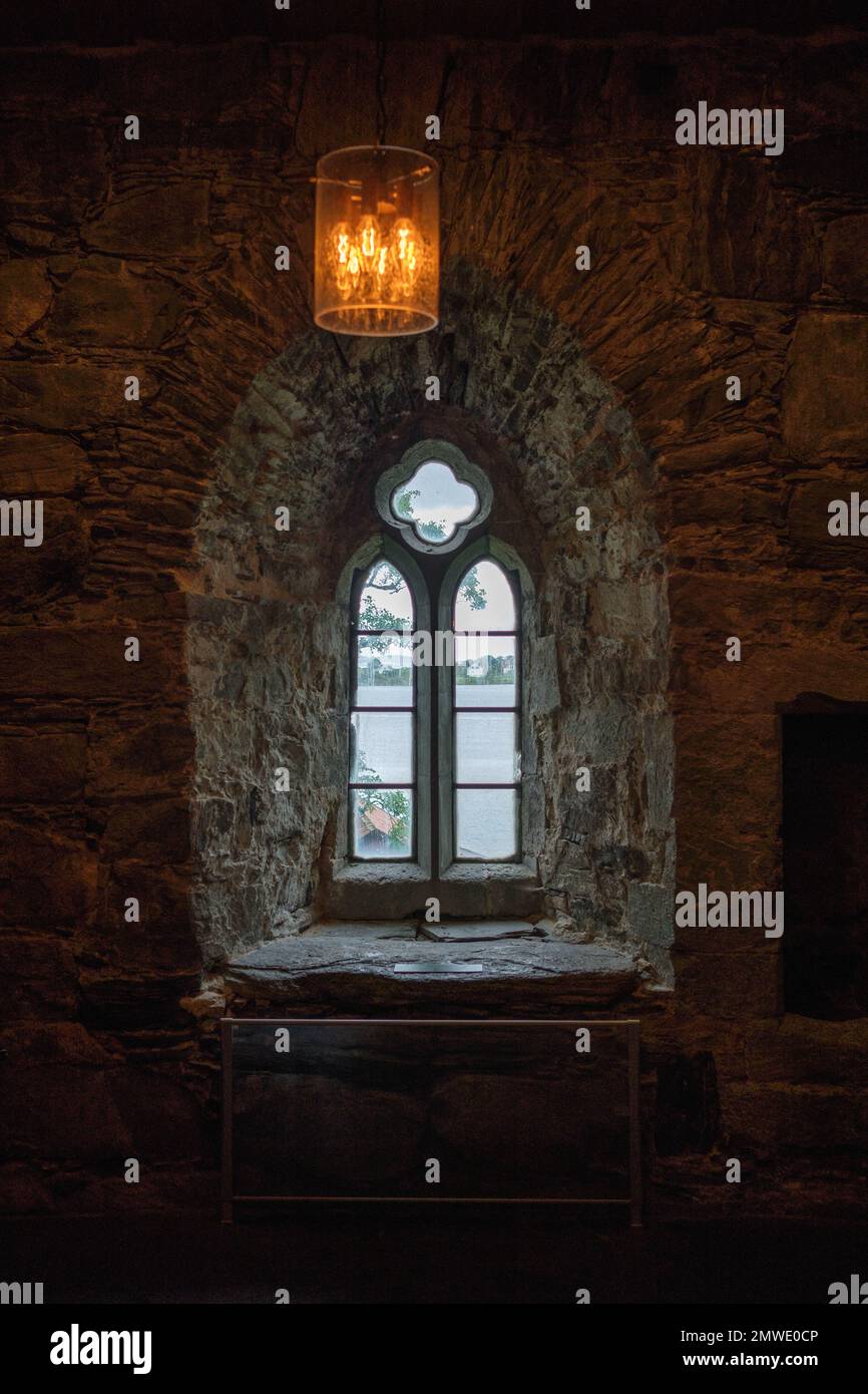 A vertical shot of the beautiful windows in the historic Utstein ...