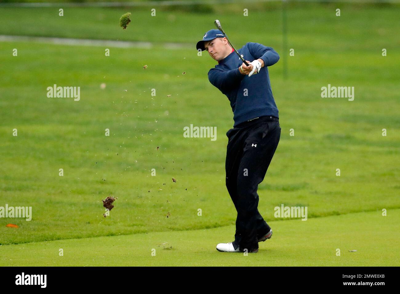 Jordan Spieth follows his shot on the 17th hole during the second round ...