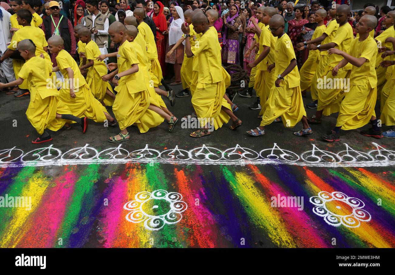 Young Hindu devotees participate in a chariot procession of Lord ...