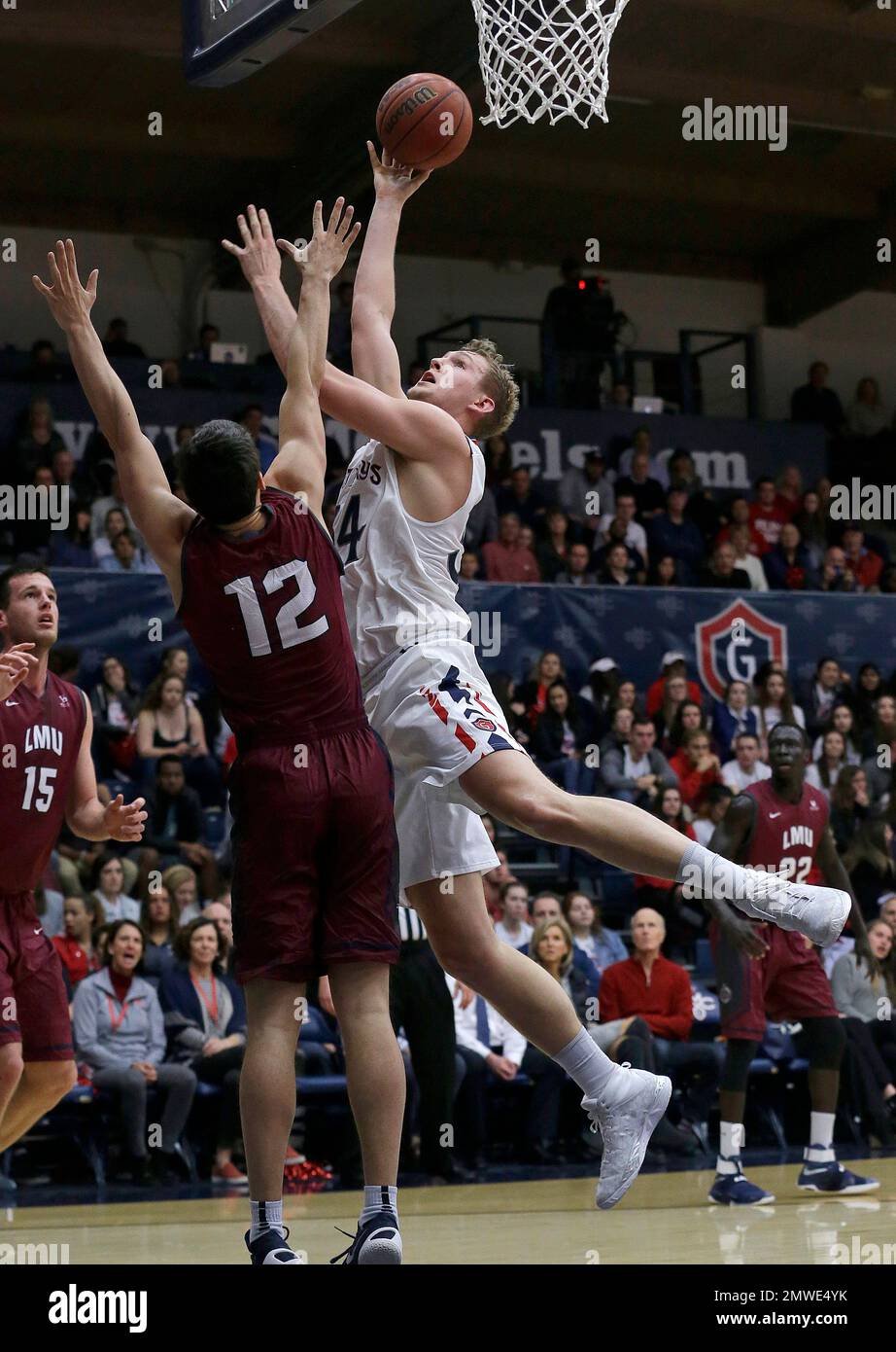 St. Mary's center Jock Landale, right, shoots against Loyola Marymount ...