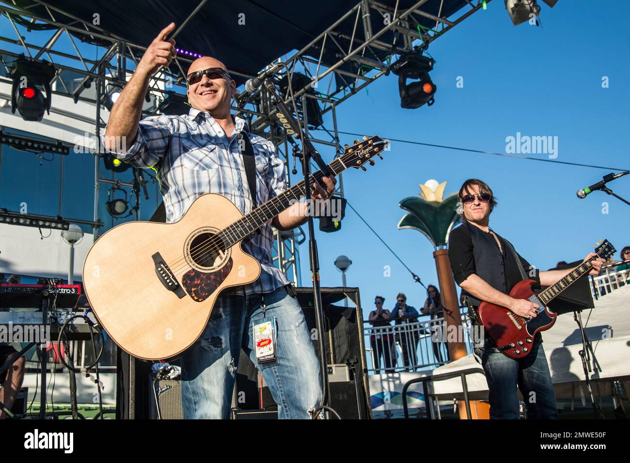Ken Block, left, and Ryan Newell of Sister Hazel performs on board the ...