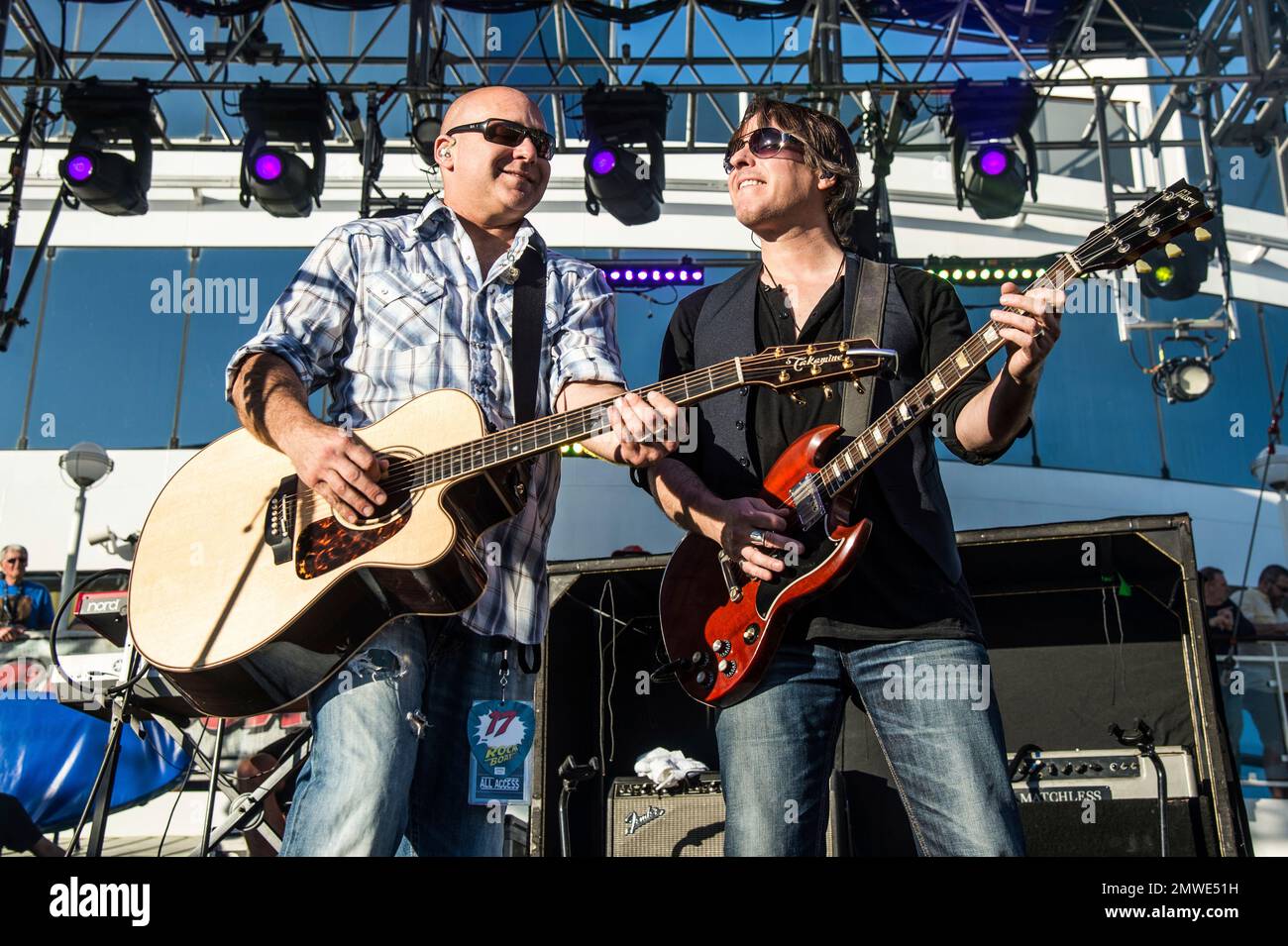 Ken Block, left, and Ryan Newell of Sister Hazel performs on board the ...
