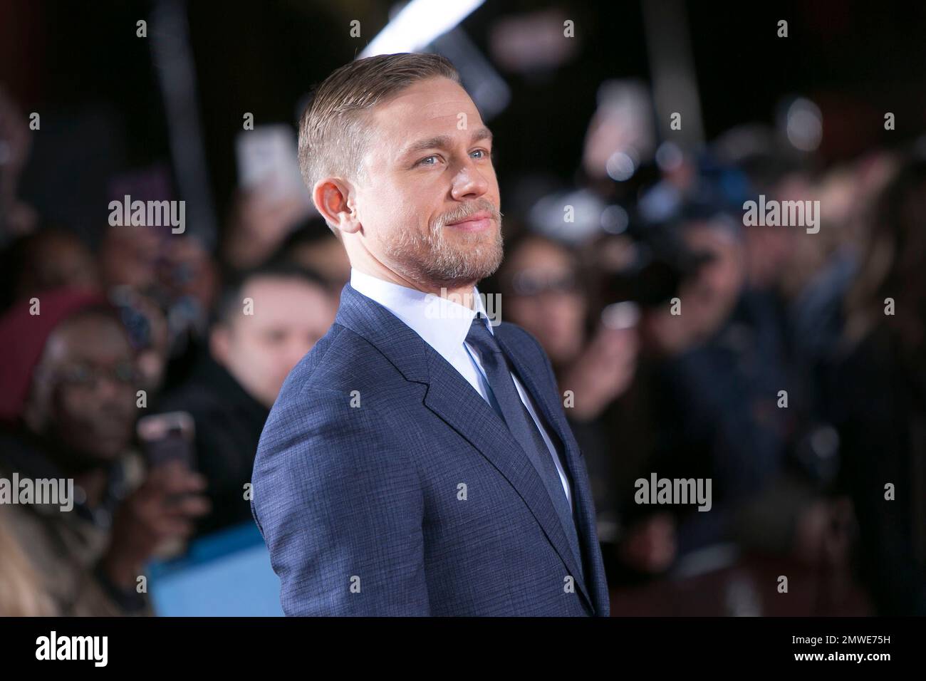 Actor Charlie Hunnam poses for photographers during the UK premiere for ...