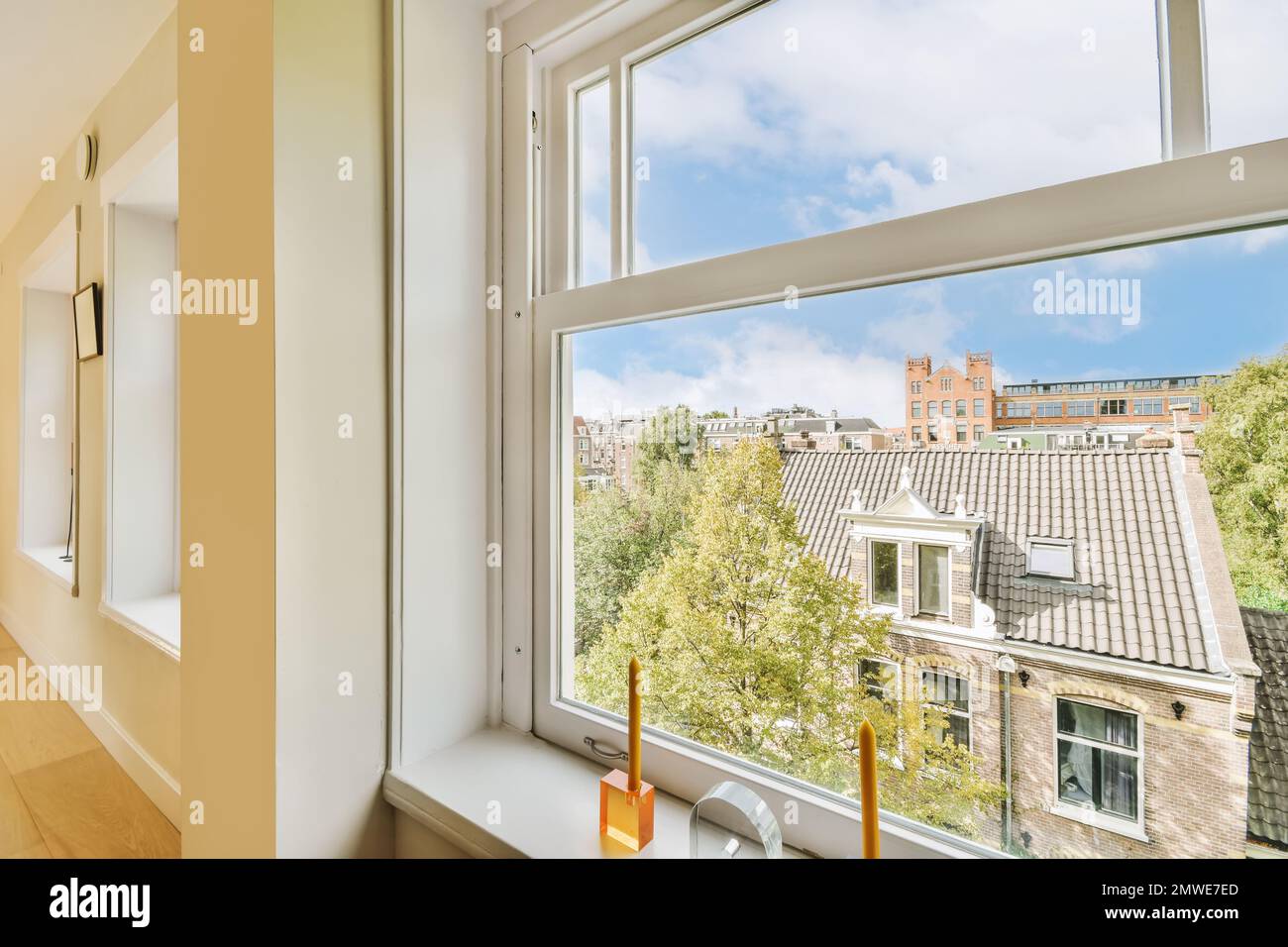 an empty room with large windows looking out onto the cityscapearl ...