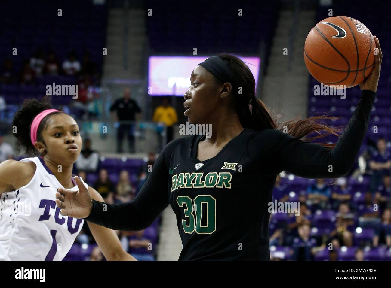 Baylor's Alexis Jones (30) plays against TCU's Toree Thompson (1 ...