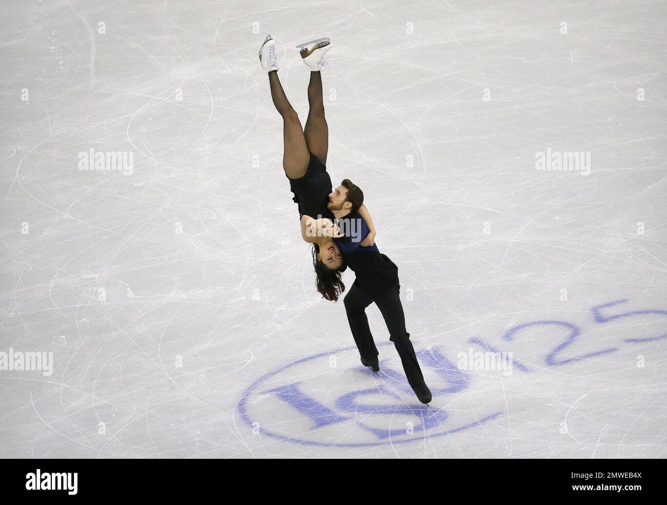 Yura Min and Alexander Gamelin from South Korea perform in the Ice ...