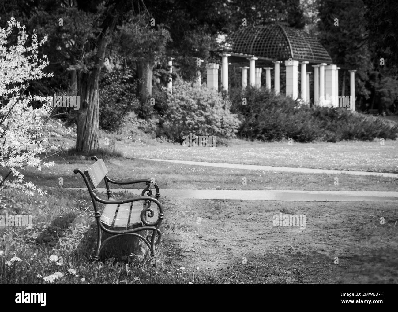 Castle park with a bench and a pavillon, bw mood Stock Photo - Alamy