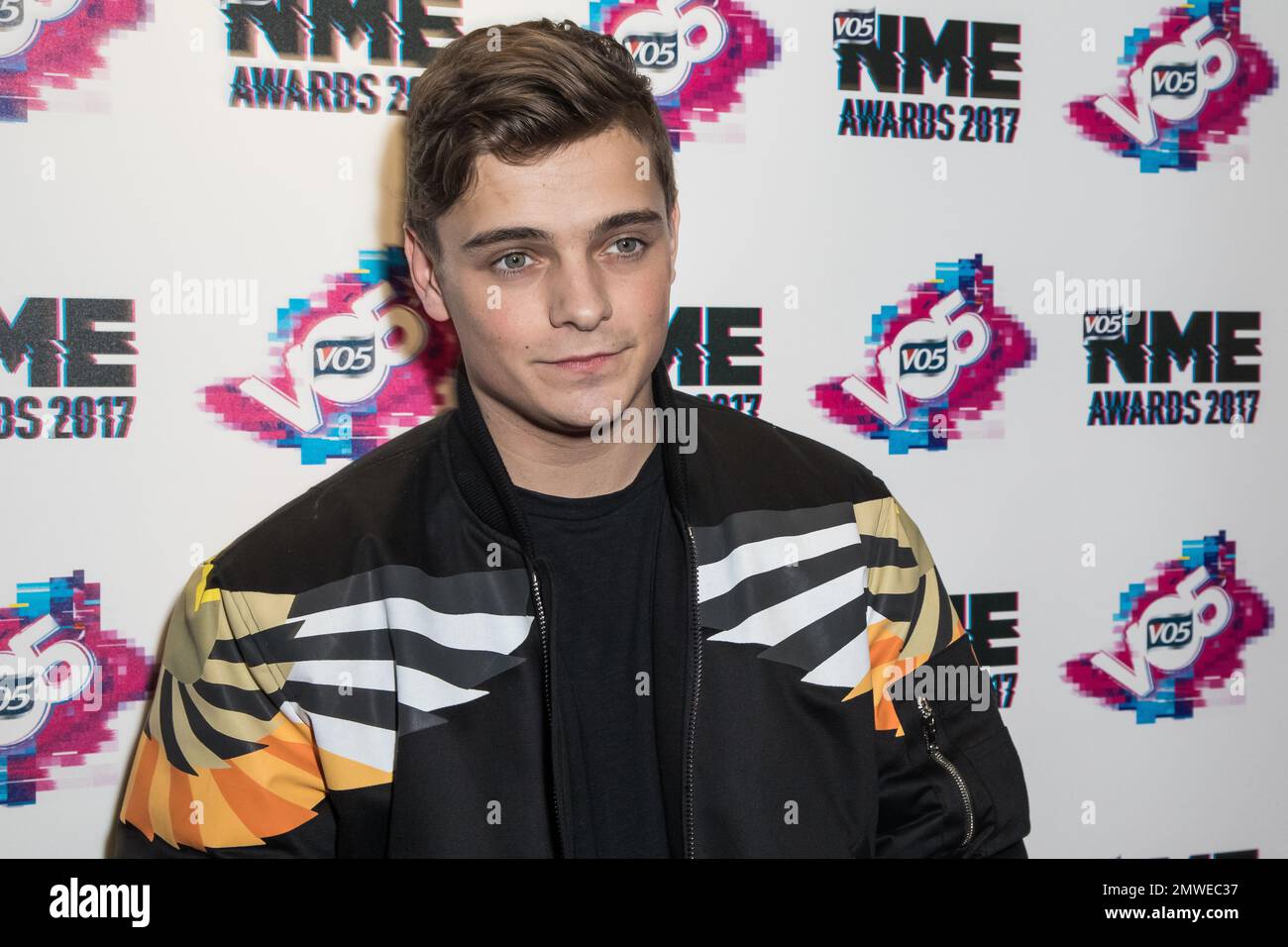 Martin Garrix poses for photographers upon arrival at the NME 2017 ...