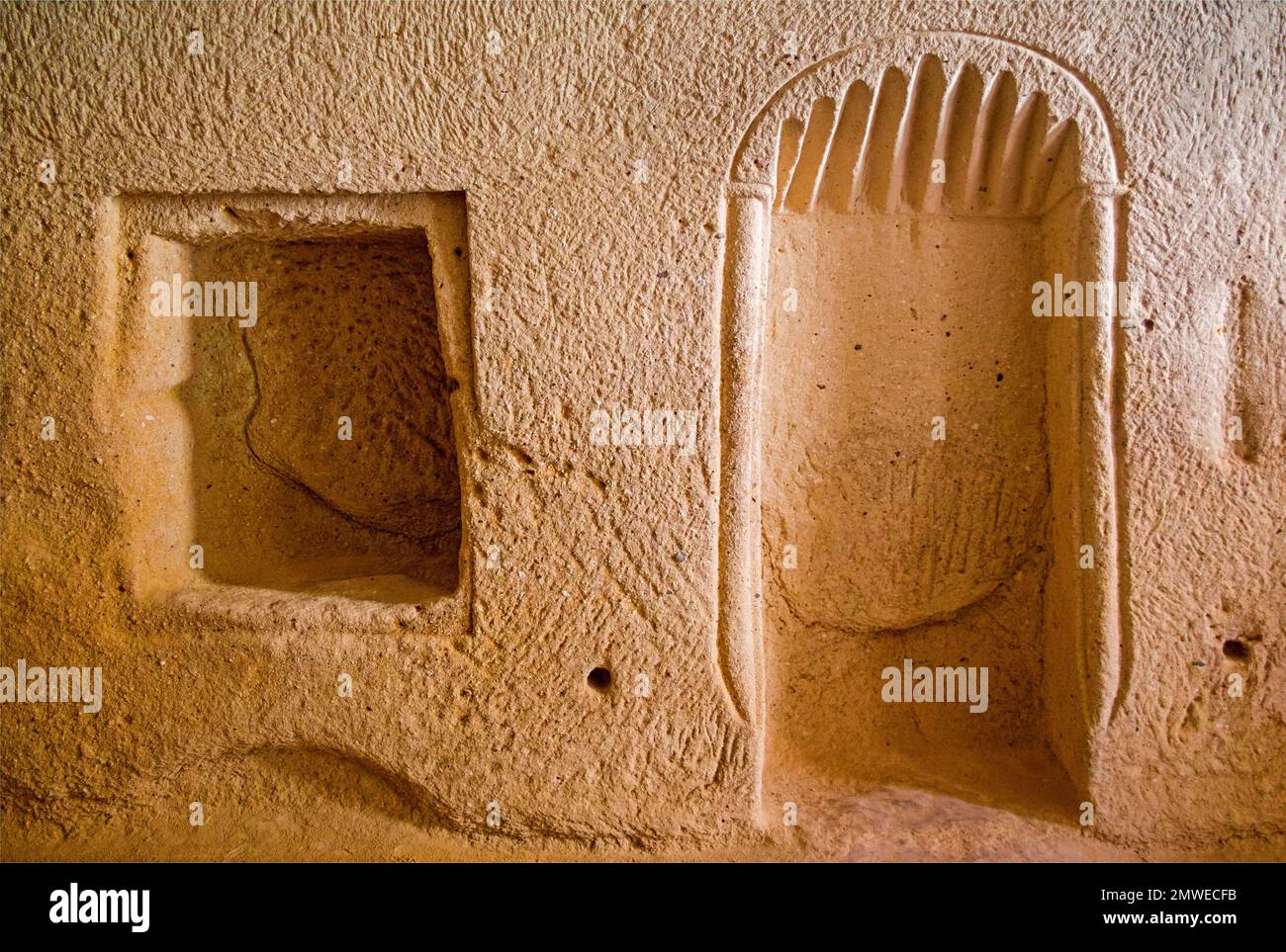 Prayer niche in cave mosque, Zelve valley, fantastic tuff formations ...