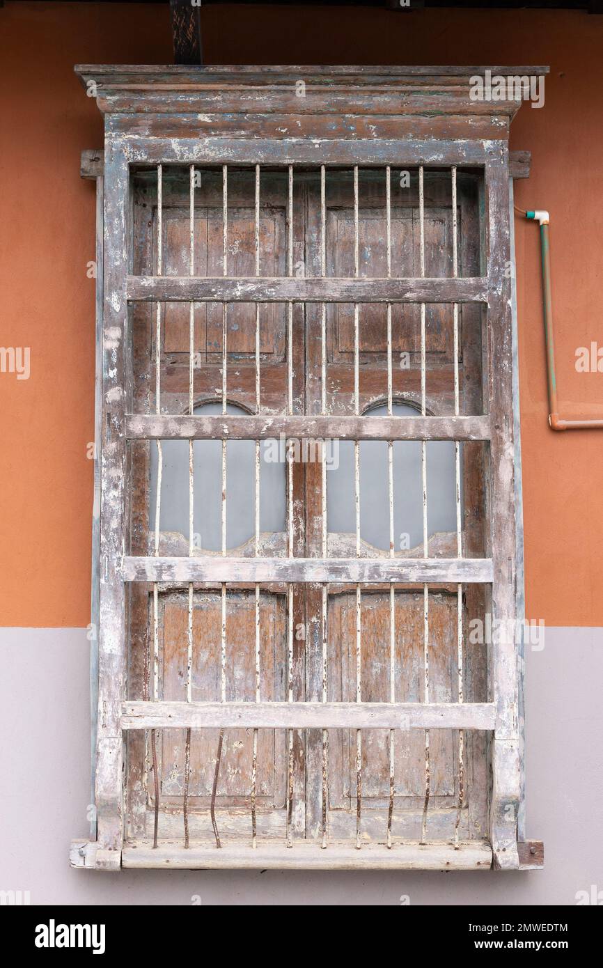 Colonial window in rustic wood, front view Stock Photo - Alamy