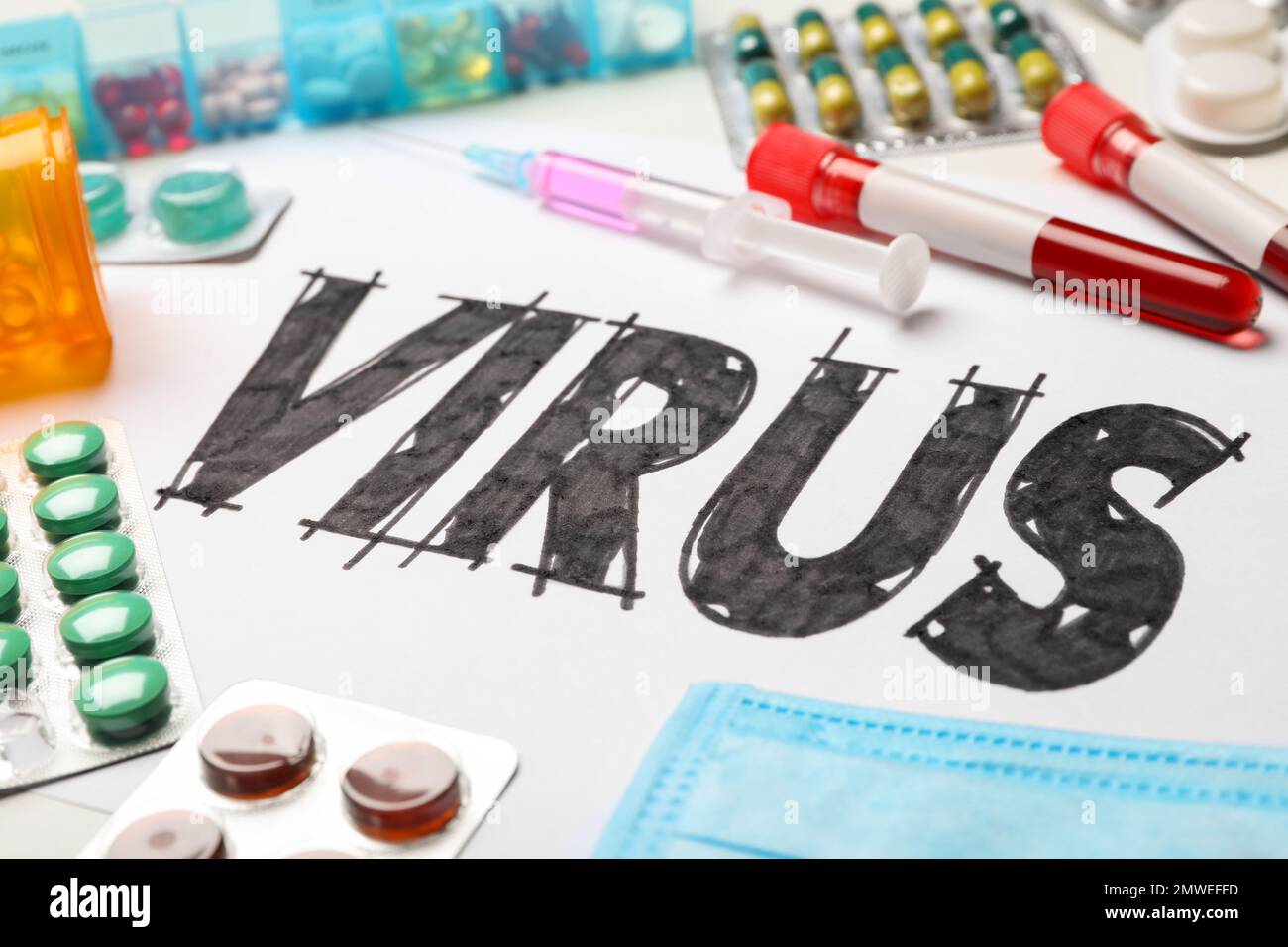 Word VIRUS and medicines on white background Stock Photo - Alamy