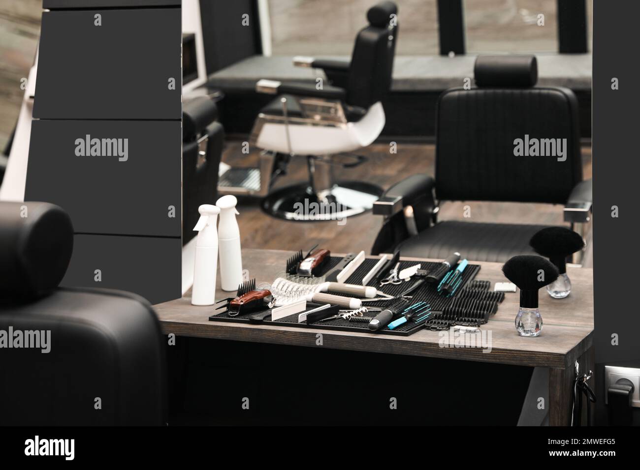 Hairdresser tools on table in barber shop Stock Photo - Alamy