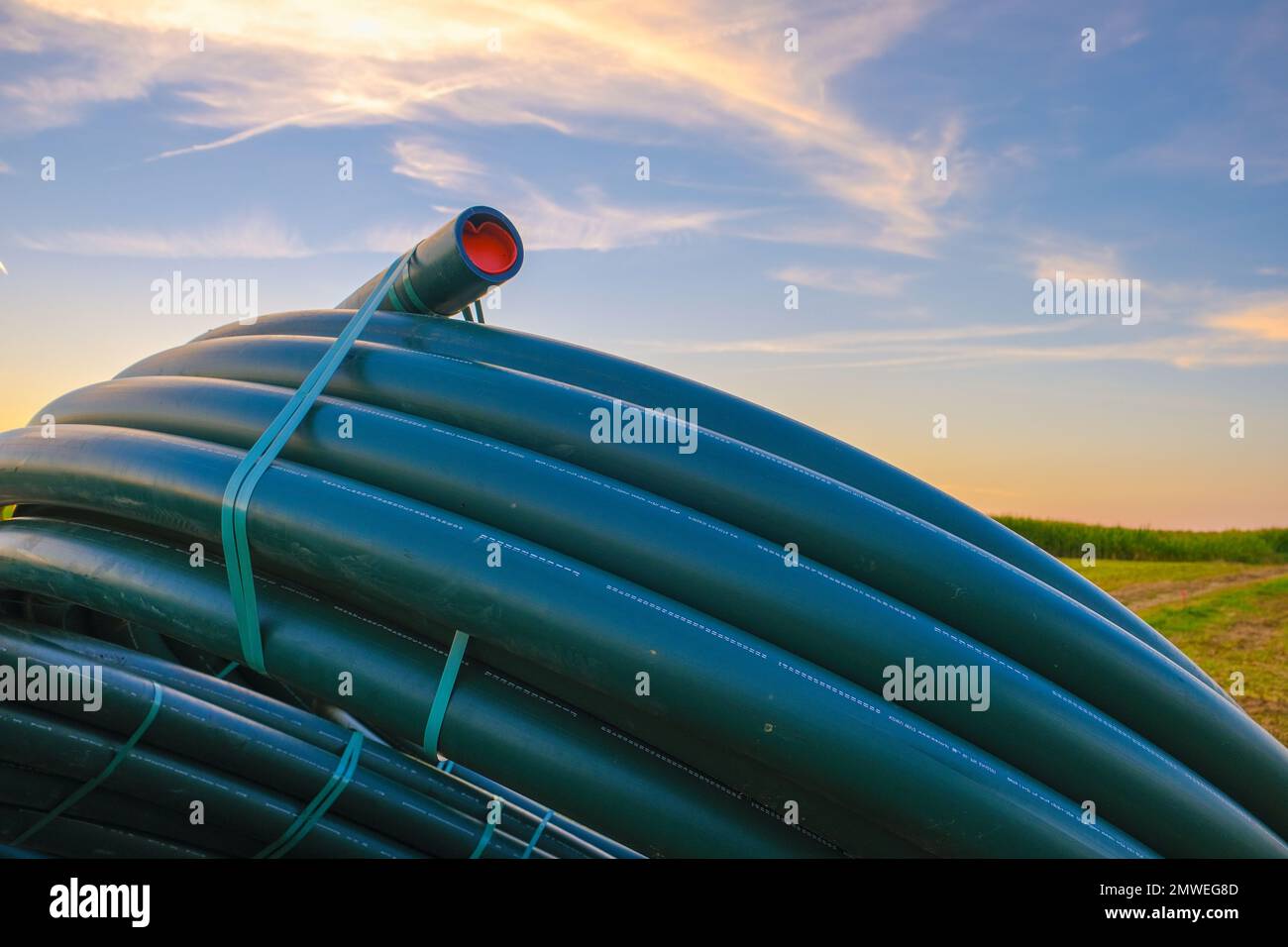 Plumbing plastic pipes in rolls .Plumbing equipment. Pipe laying ...