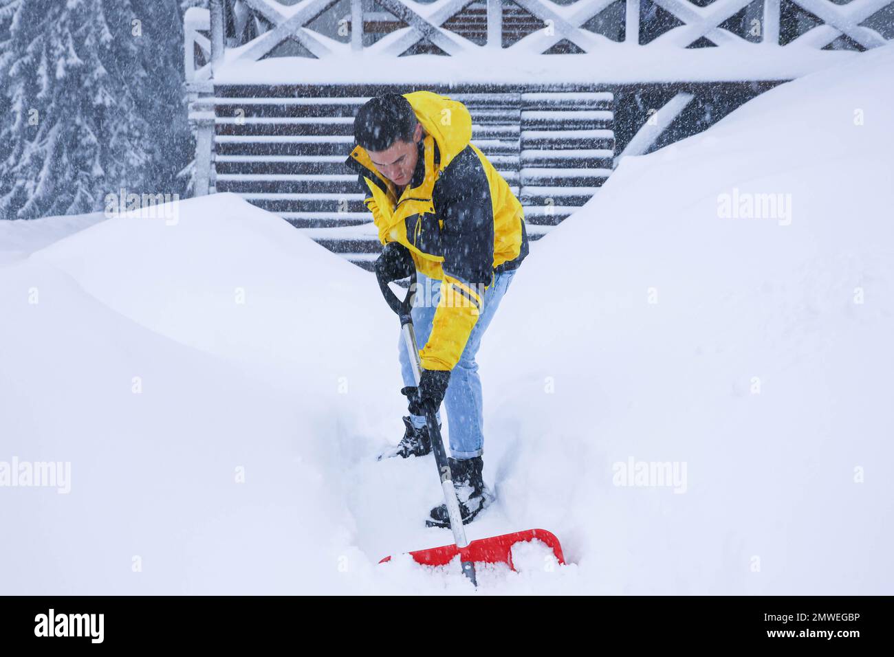 Man shoveling snow near hi-res stock photography and images - Alamy