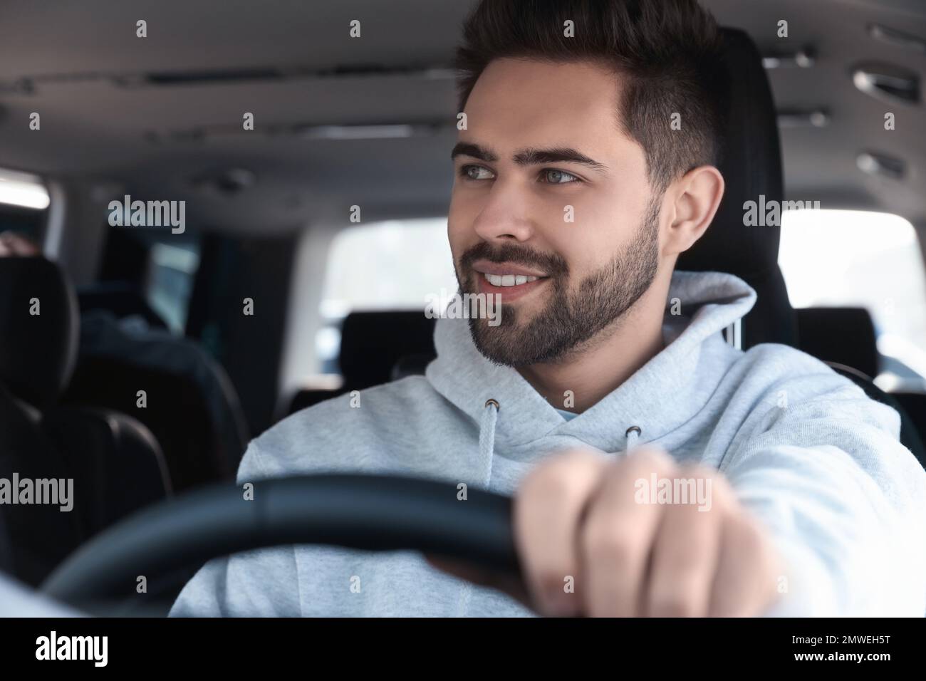 Handsome guy driving van hi-res stock photography and images - Alamy