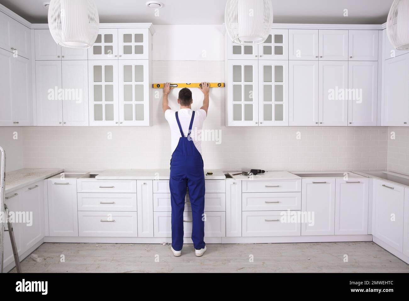 Installing cabinets hi-res stock photography and images - Alamy