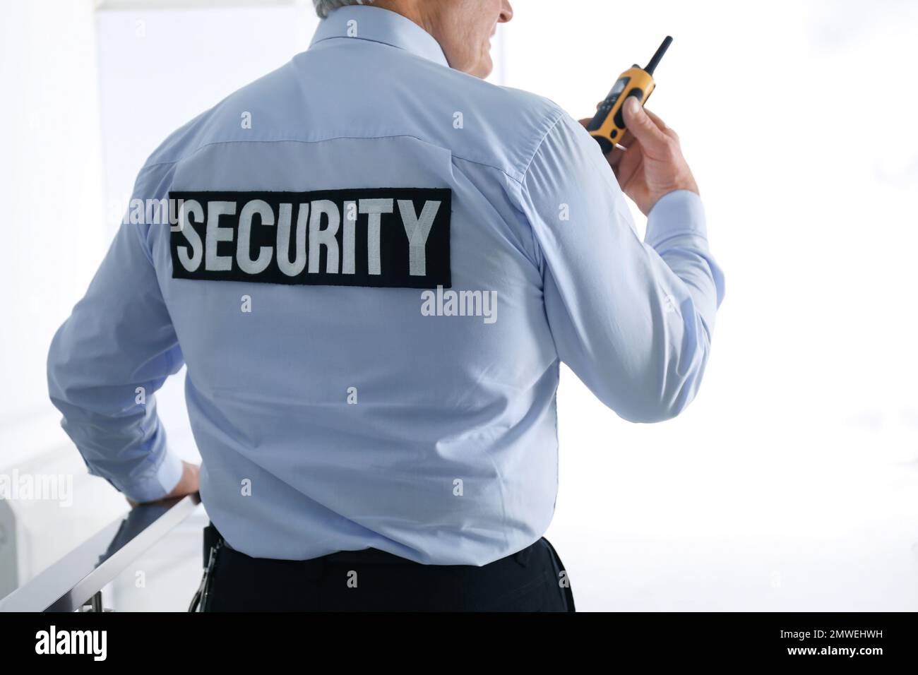 Security guard back radio hi-res stock photography and images - Alamy
