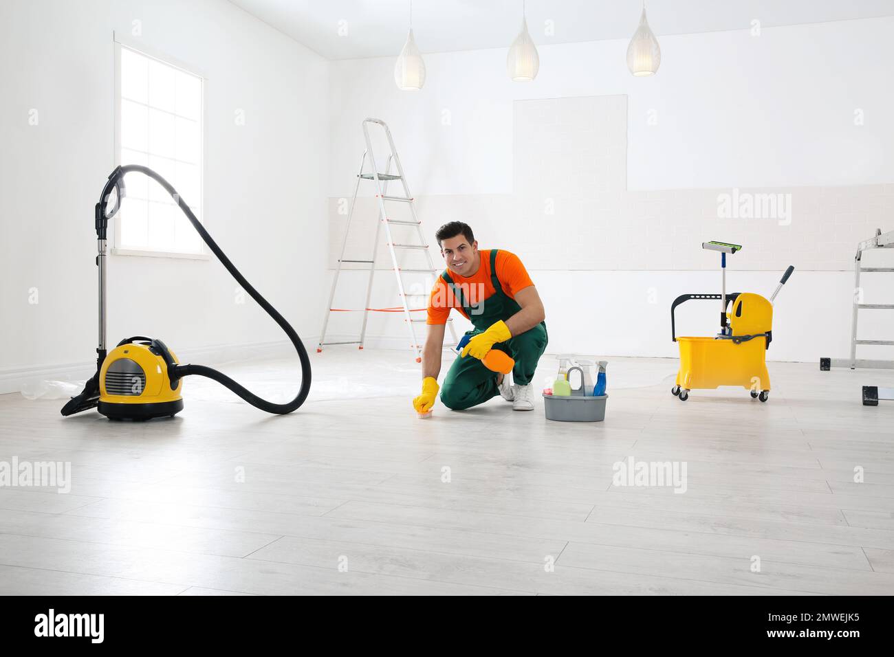 Professional janitor cleaning floor hi-res stock photography and images ...