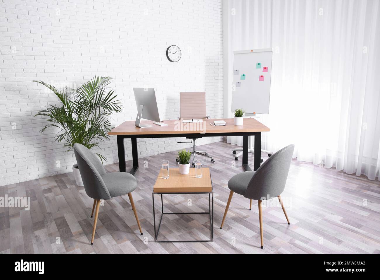 Interior of modern office with table, chairs and computer Stock Photo ...