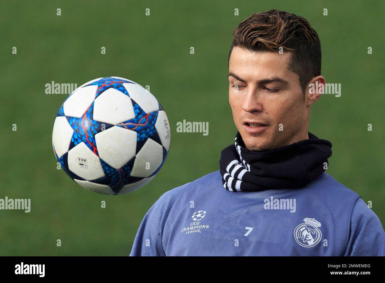 Real Madrid's Cristiano Ronaldo eyes the ball during a training session ...