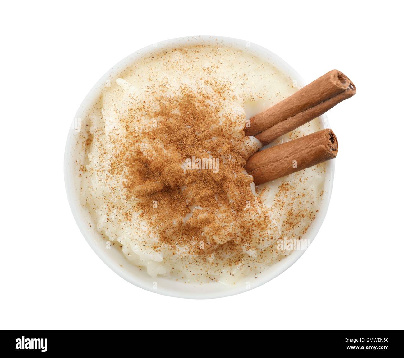Delicious rice pudding with cinnamon isolated on white, top view Stock ...