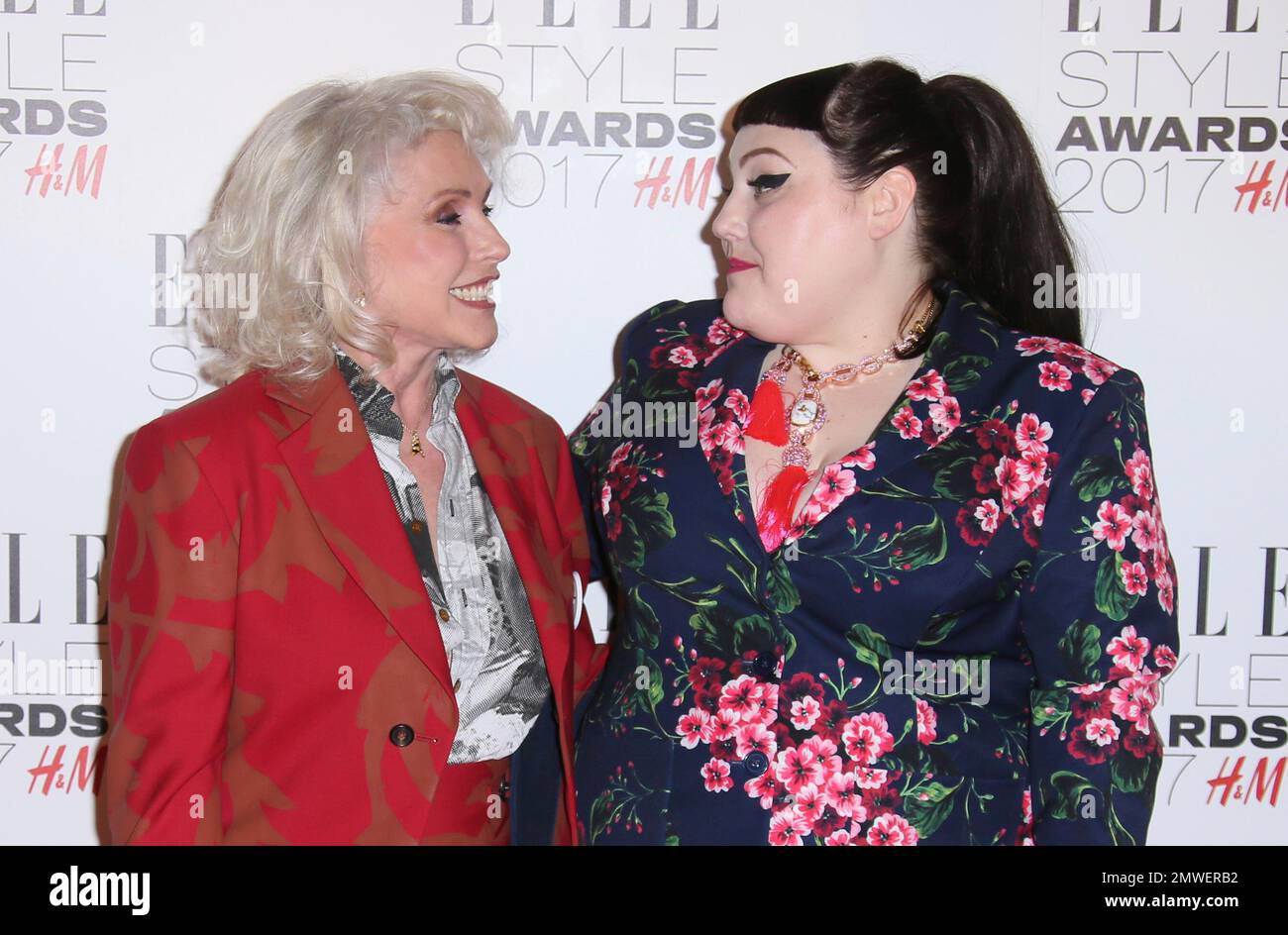 Singers Debbie Harry, left, and Beth Ditto pose for photographers upon ...