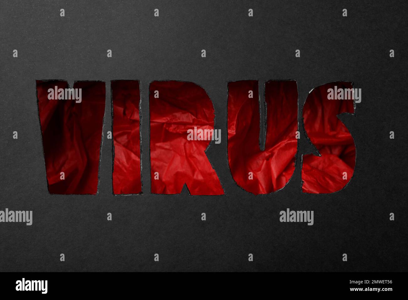 Word VIRUS cut out of black paper, top view Stock Photo - Alamy