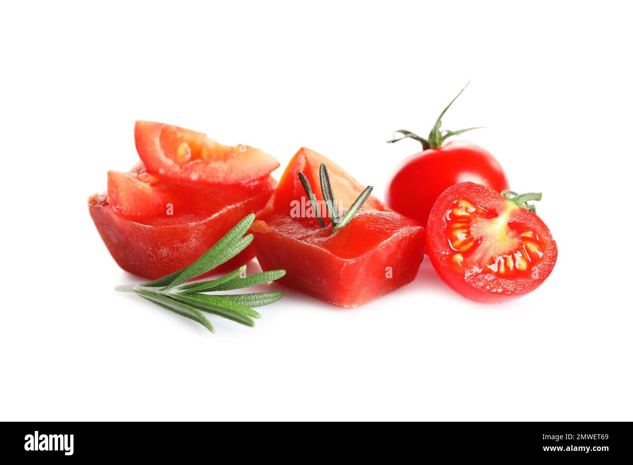Tasty tomato ice cubes on white background Stock Photo - Alamy