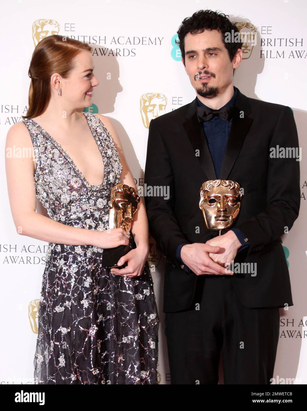 Emma Stone and Damien Chazelle at the British Academy Film Awards in ...