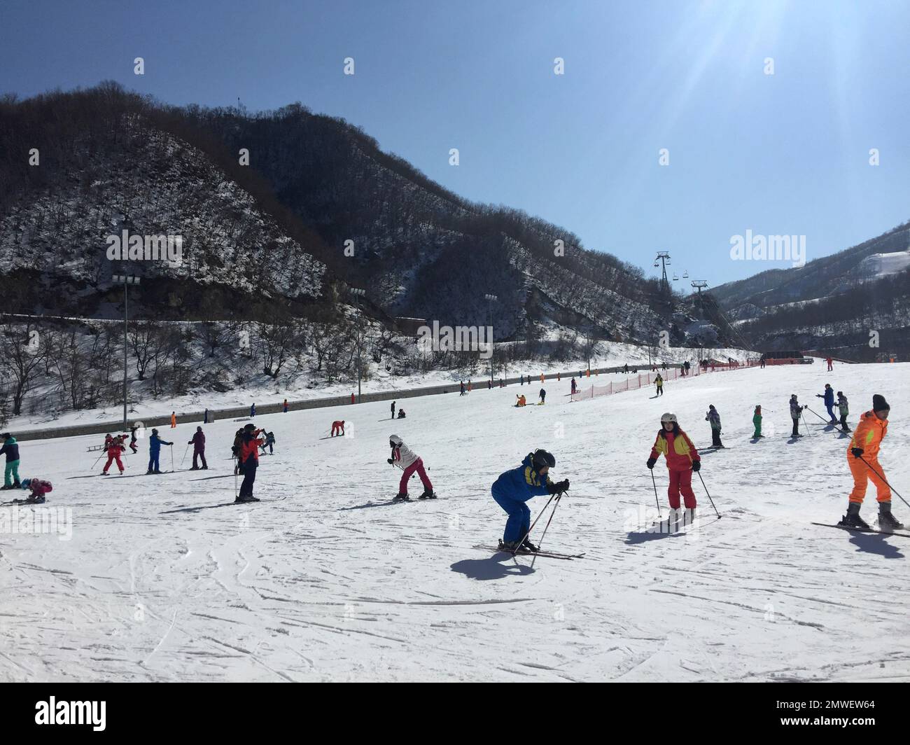 In this Saturday Feb. 11, 2017, photo, North Koreans ski at the Masik Pass Ski Resort in Wonsan ...