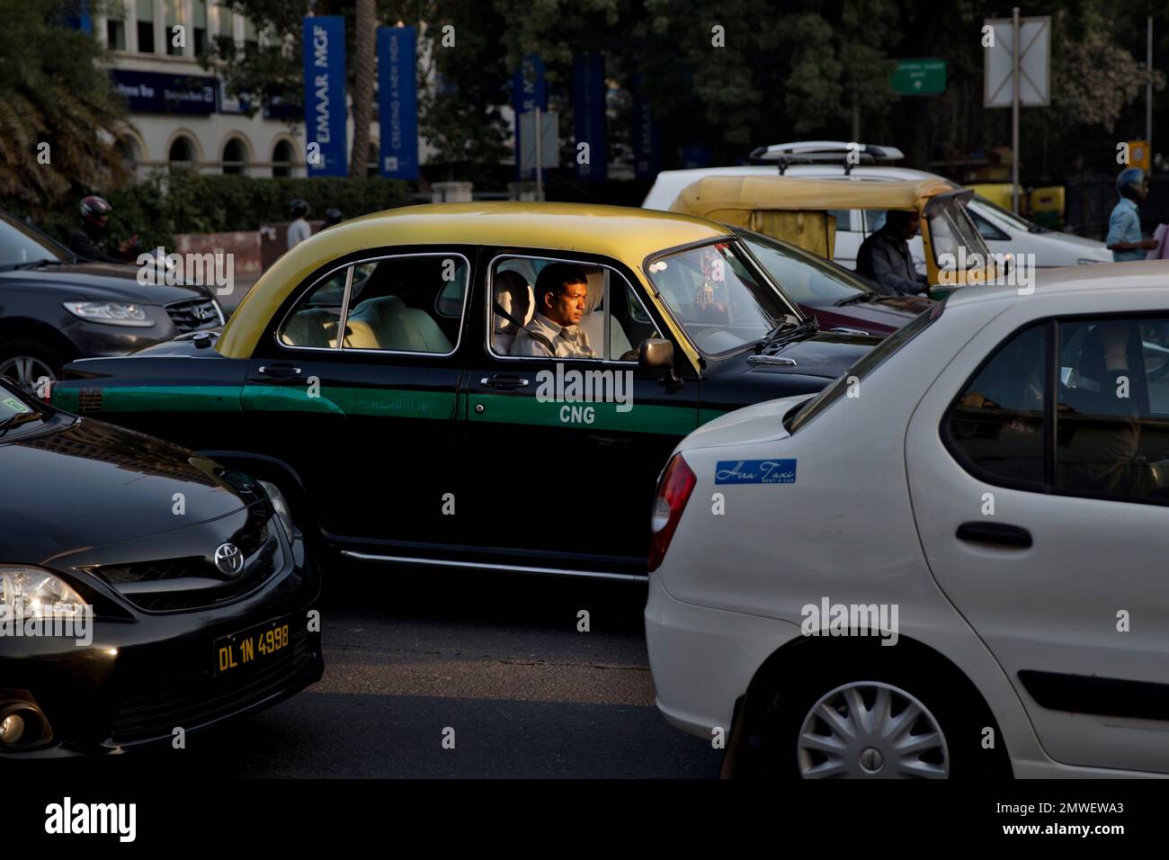 In this Dec. 8 2014 file photo, an Indian taxi driver drives an ...