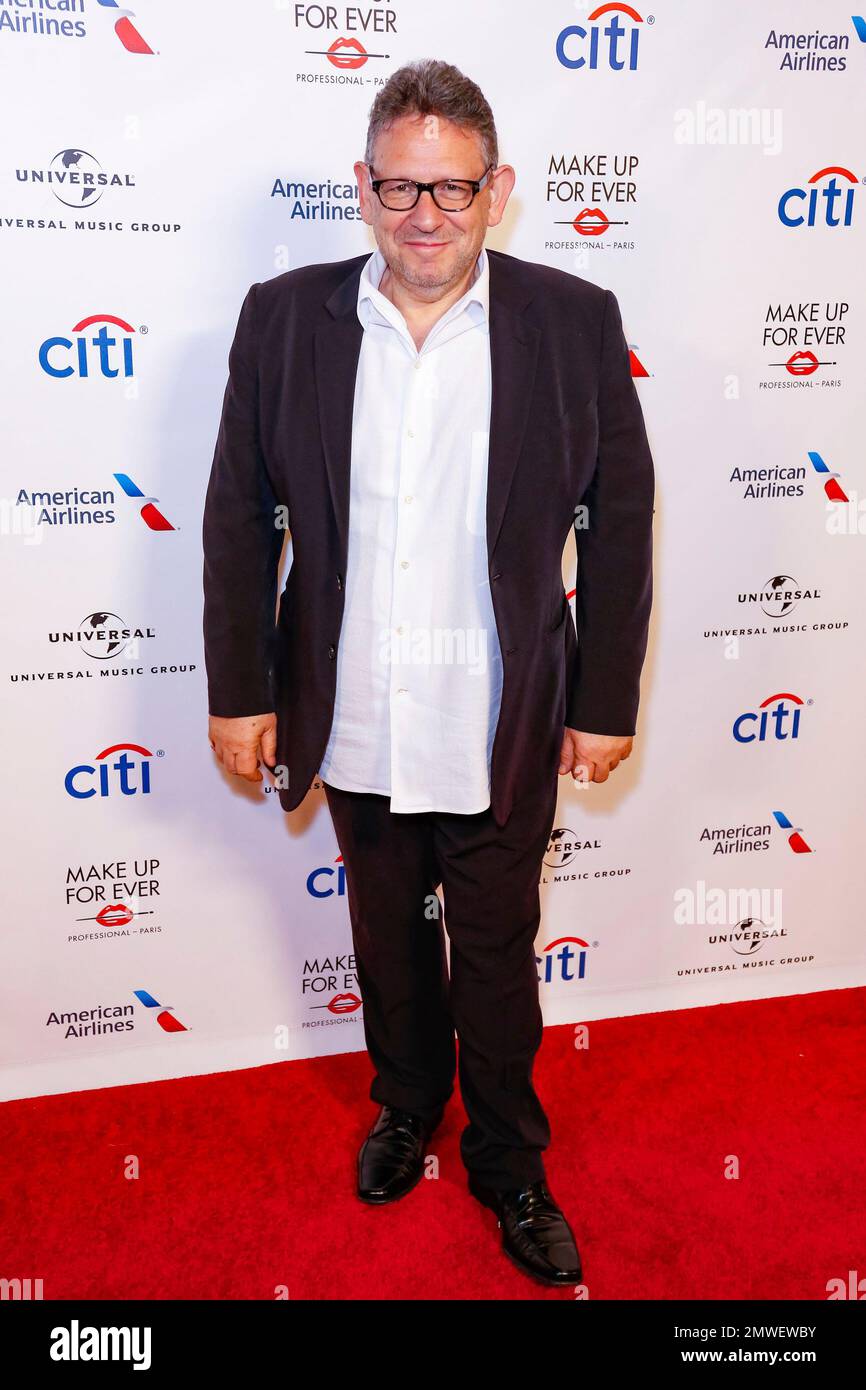 Sir Lucian Grainge arrives at the 59th Annual Grammy Awards - Universal ...