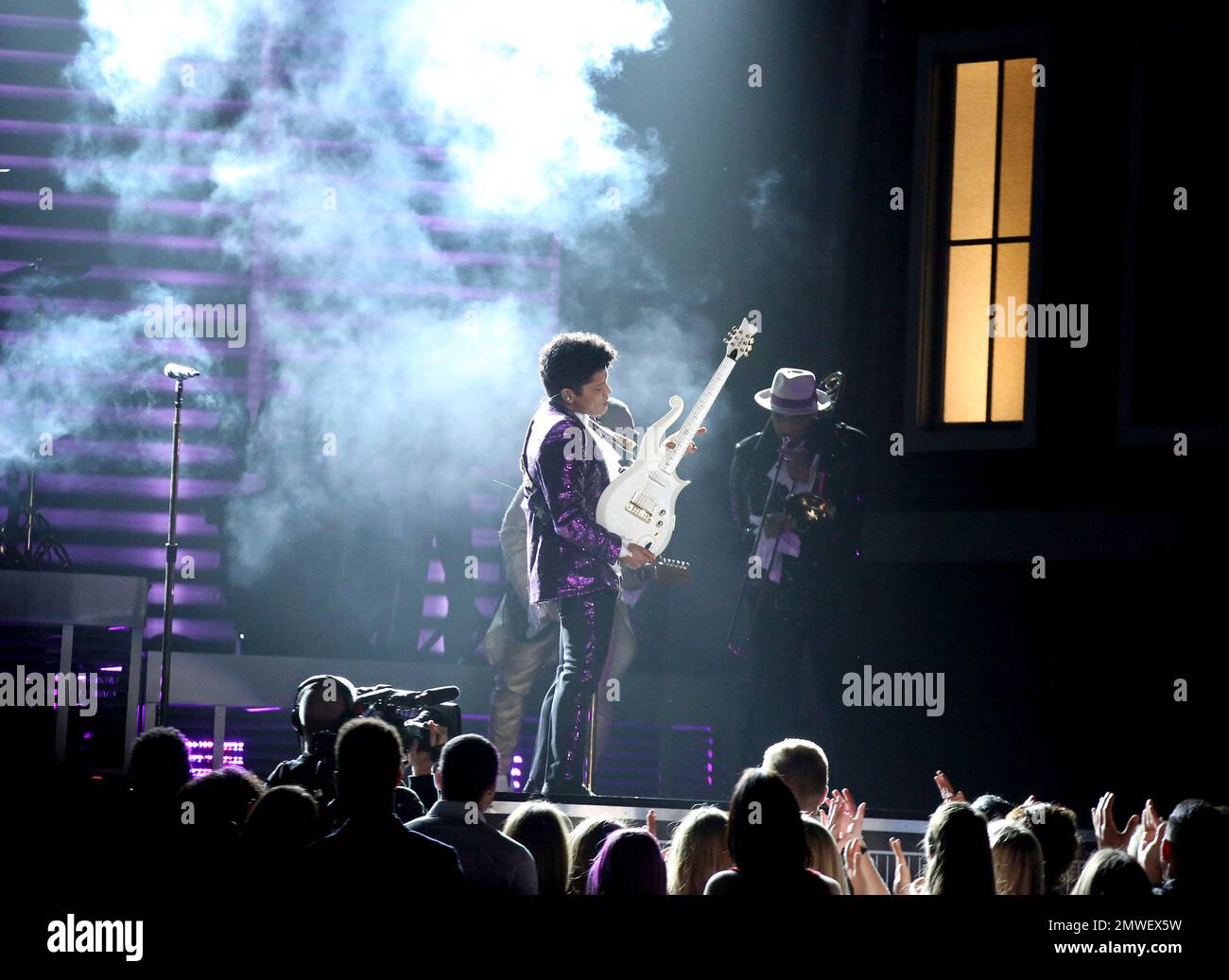 Bruno Mars performs a tribute to Prince at the 59th annual Grammy ...