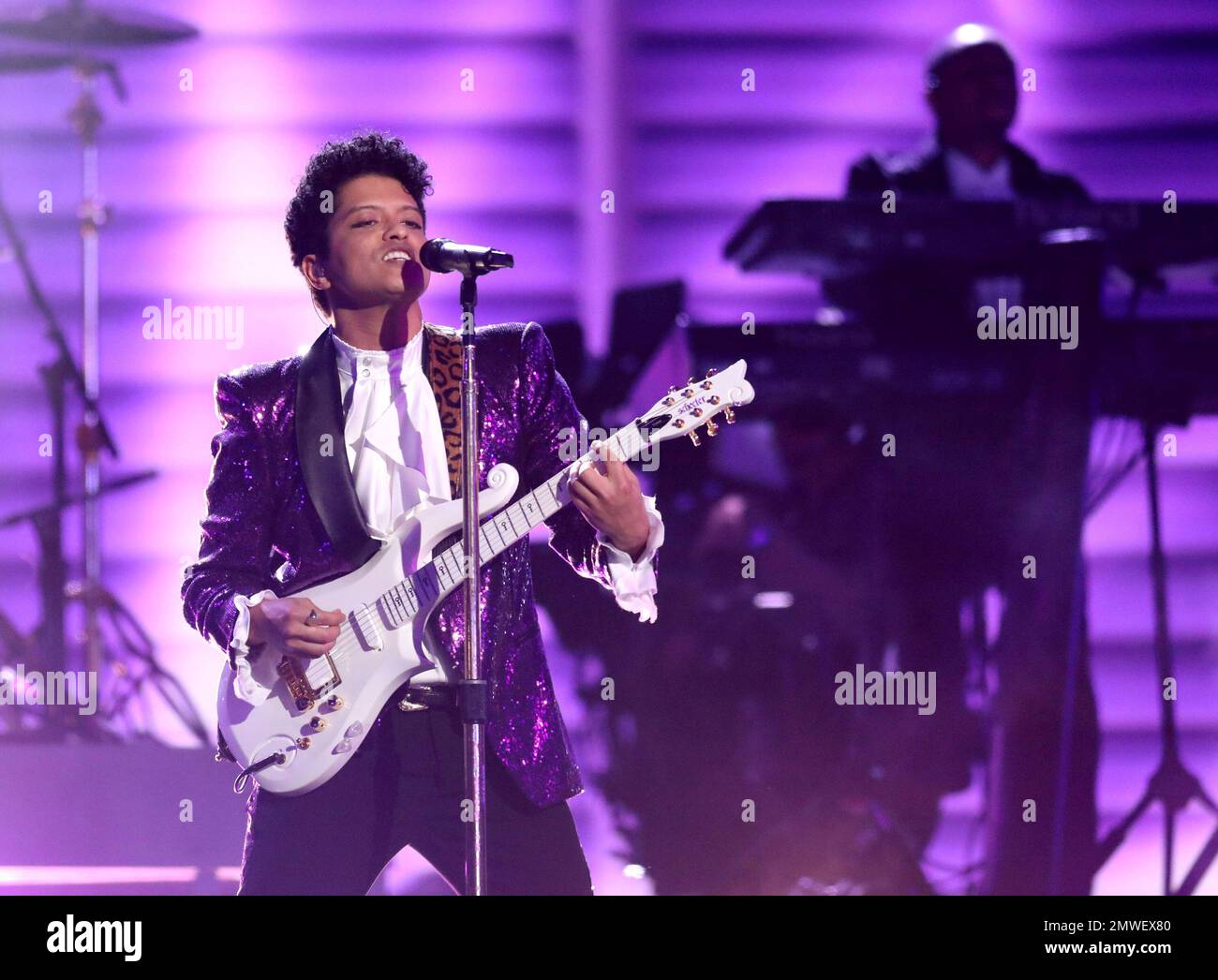 Bruno Mars performs a tribute to Prince at the 59th annual Grammy ...