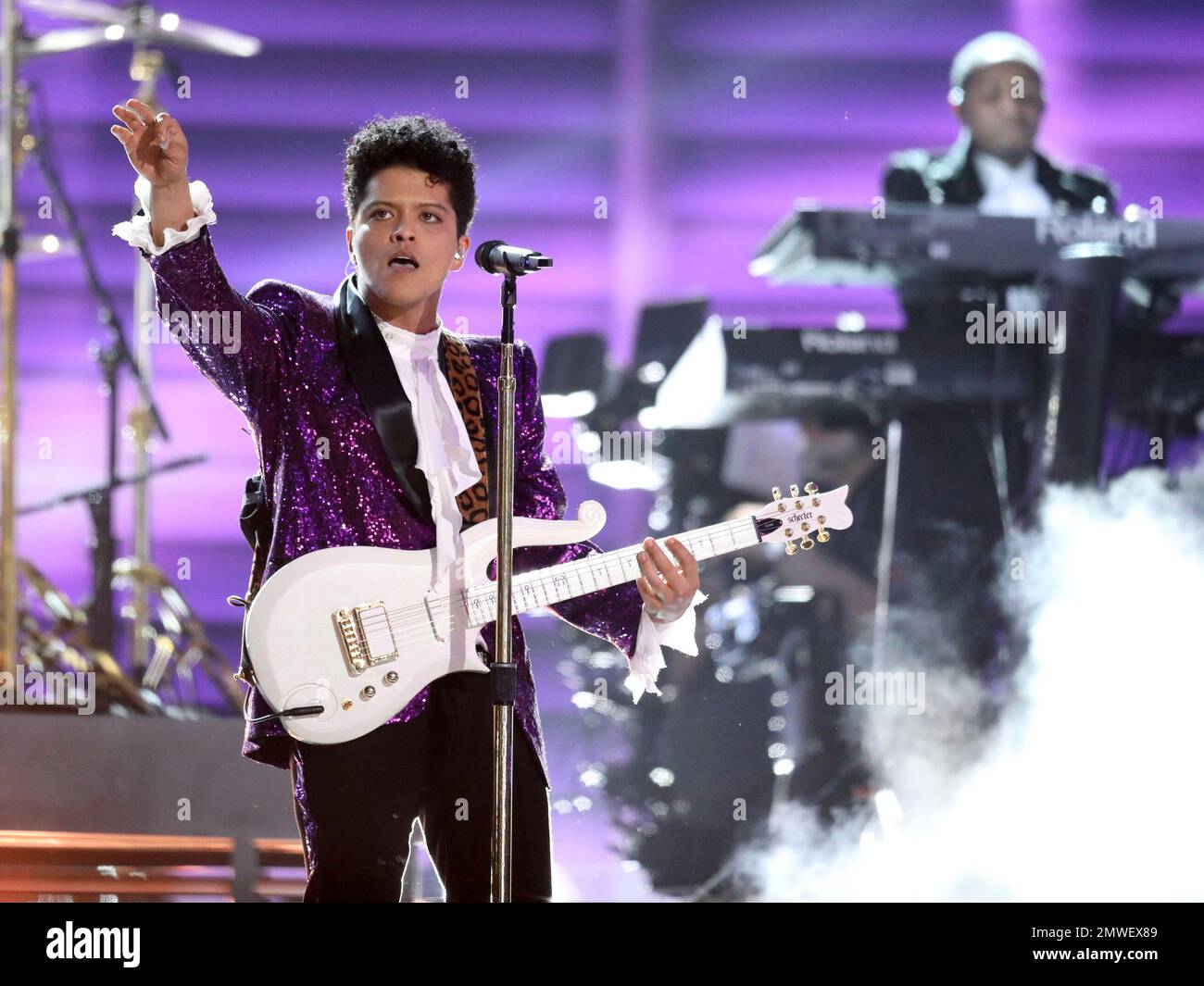 Bruno Mars performs "Let's Go Crazy" during a tribute to Prince at the ...