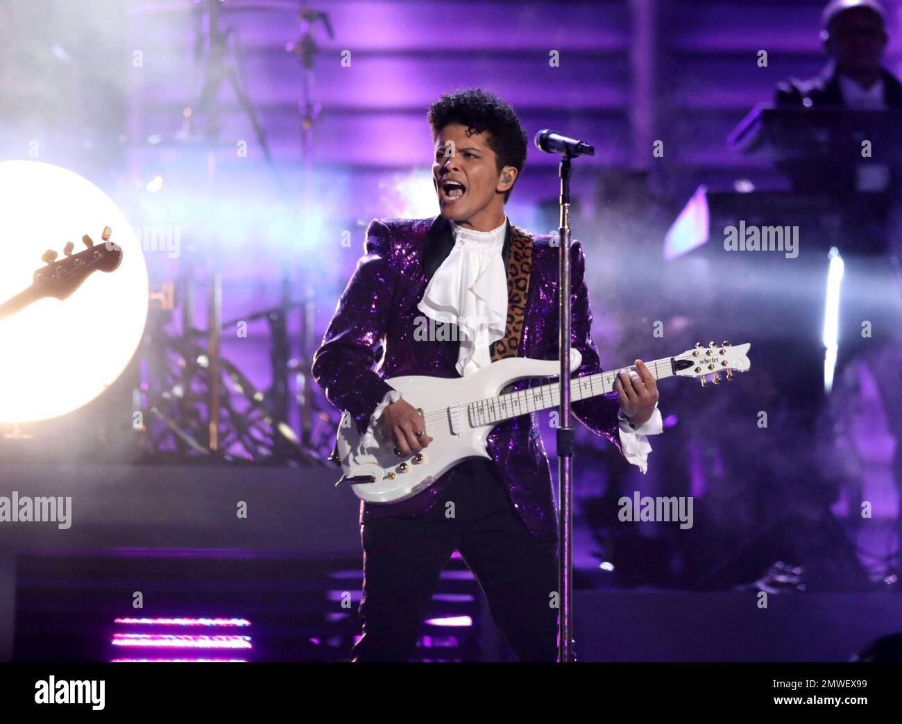 Bruno Mars performs a tribute to Prince at the 59th annual Grammy ...