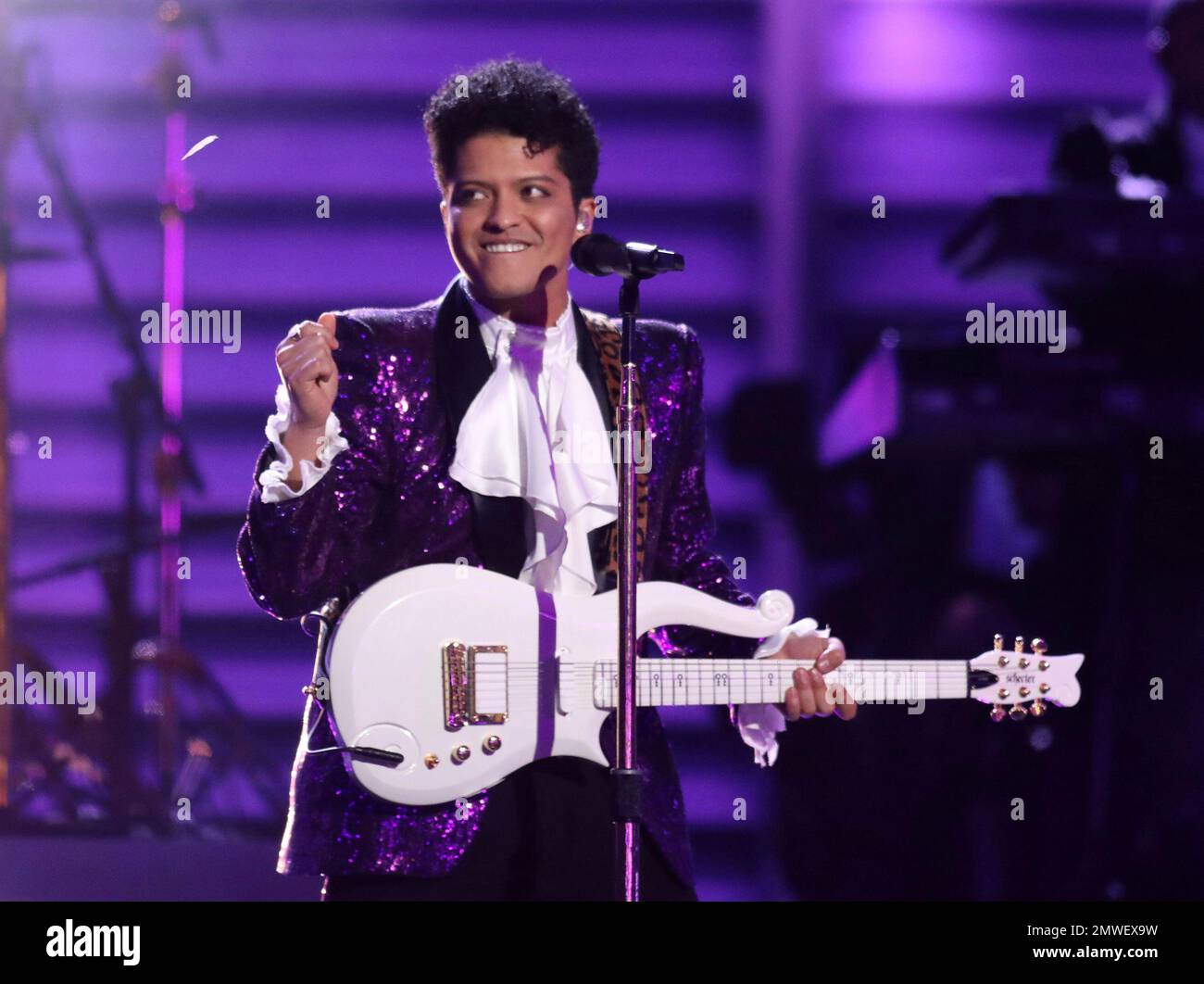 Bruno Mars performs a tribute to Prince at the 59th annual Grammy ...