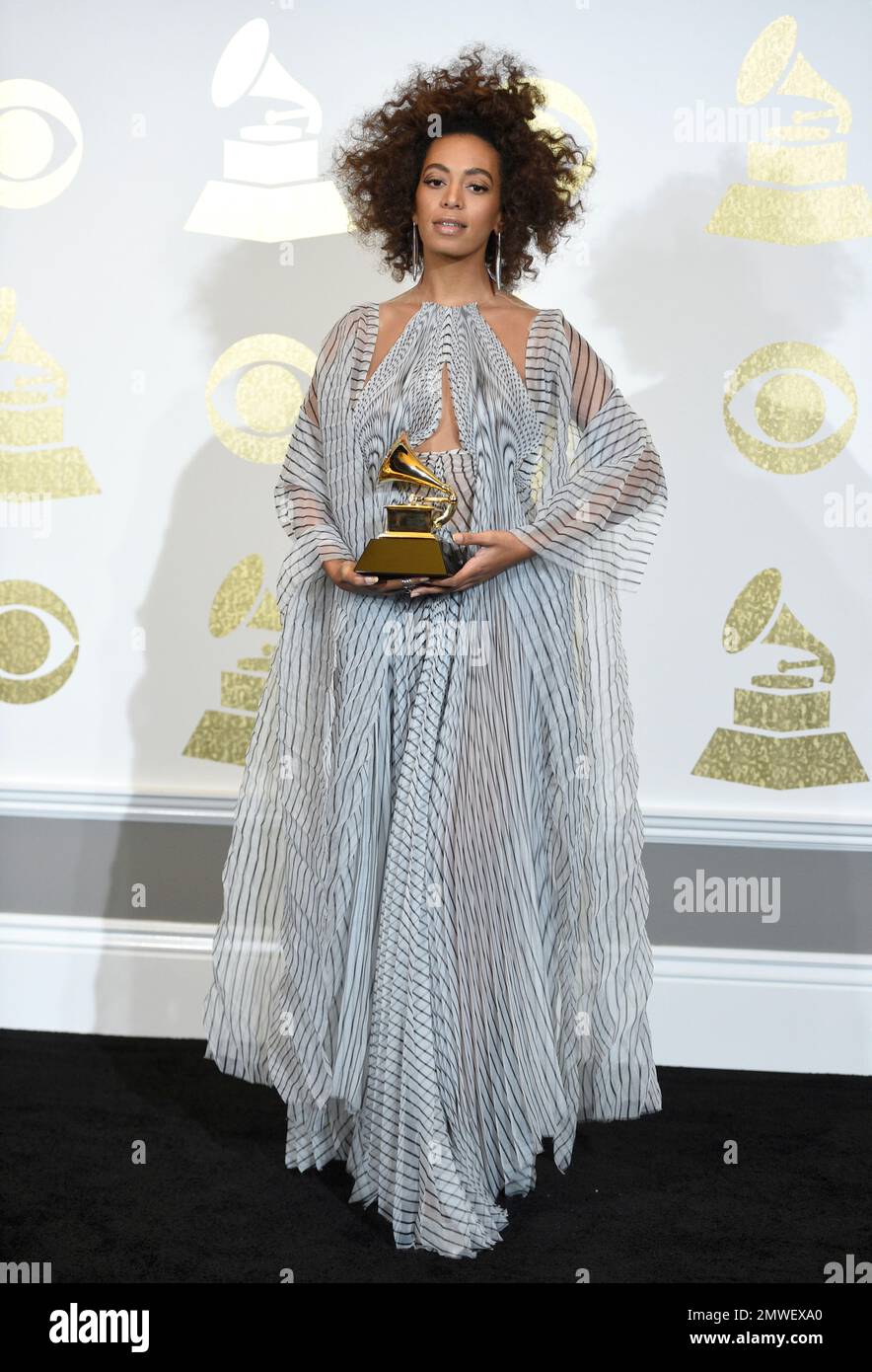 Solange poses in the press room with the award for best R&B performance ...
