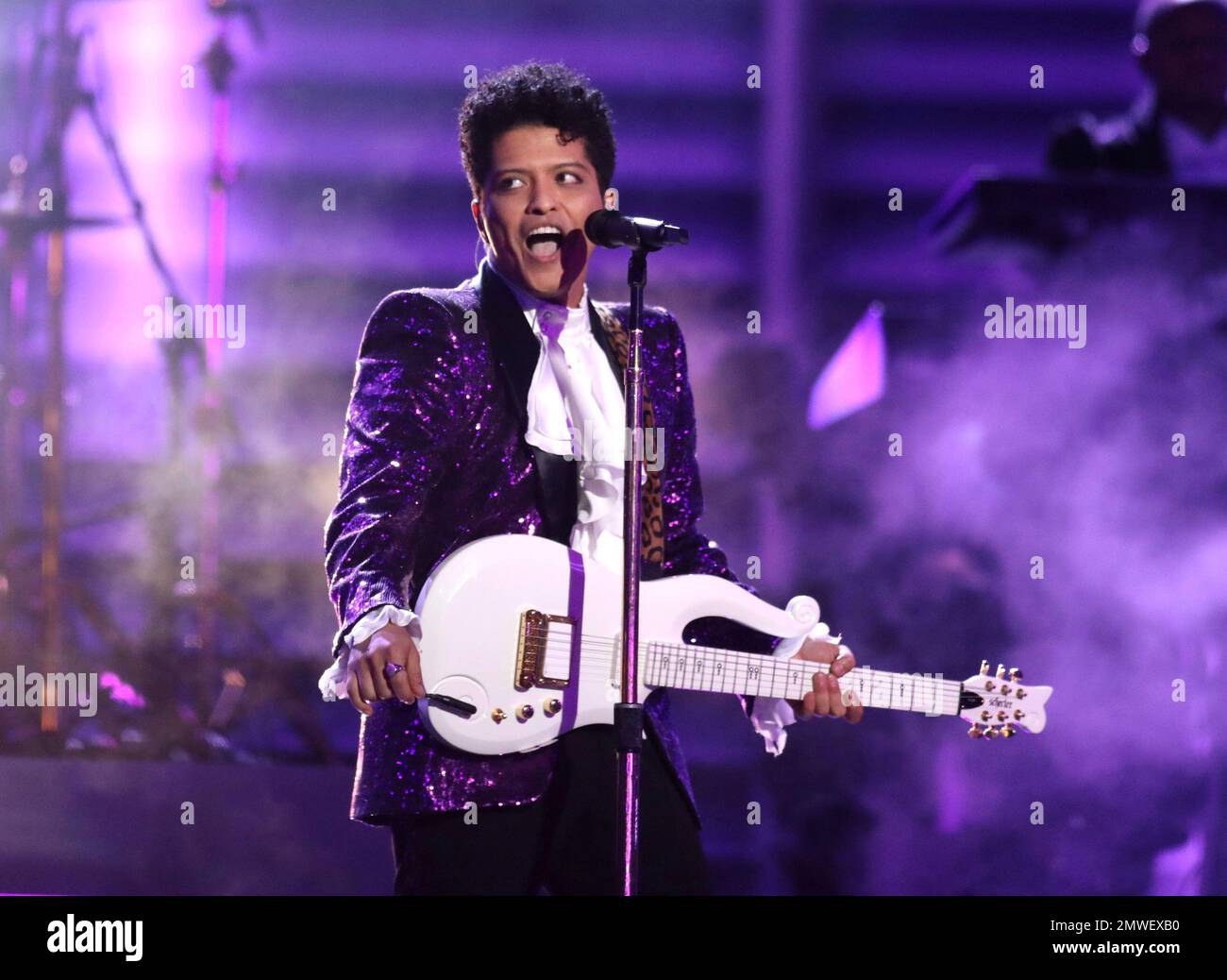 Bruno Mars performs a tribute to Prince at the 59th annual Grammy ...