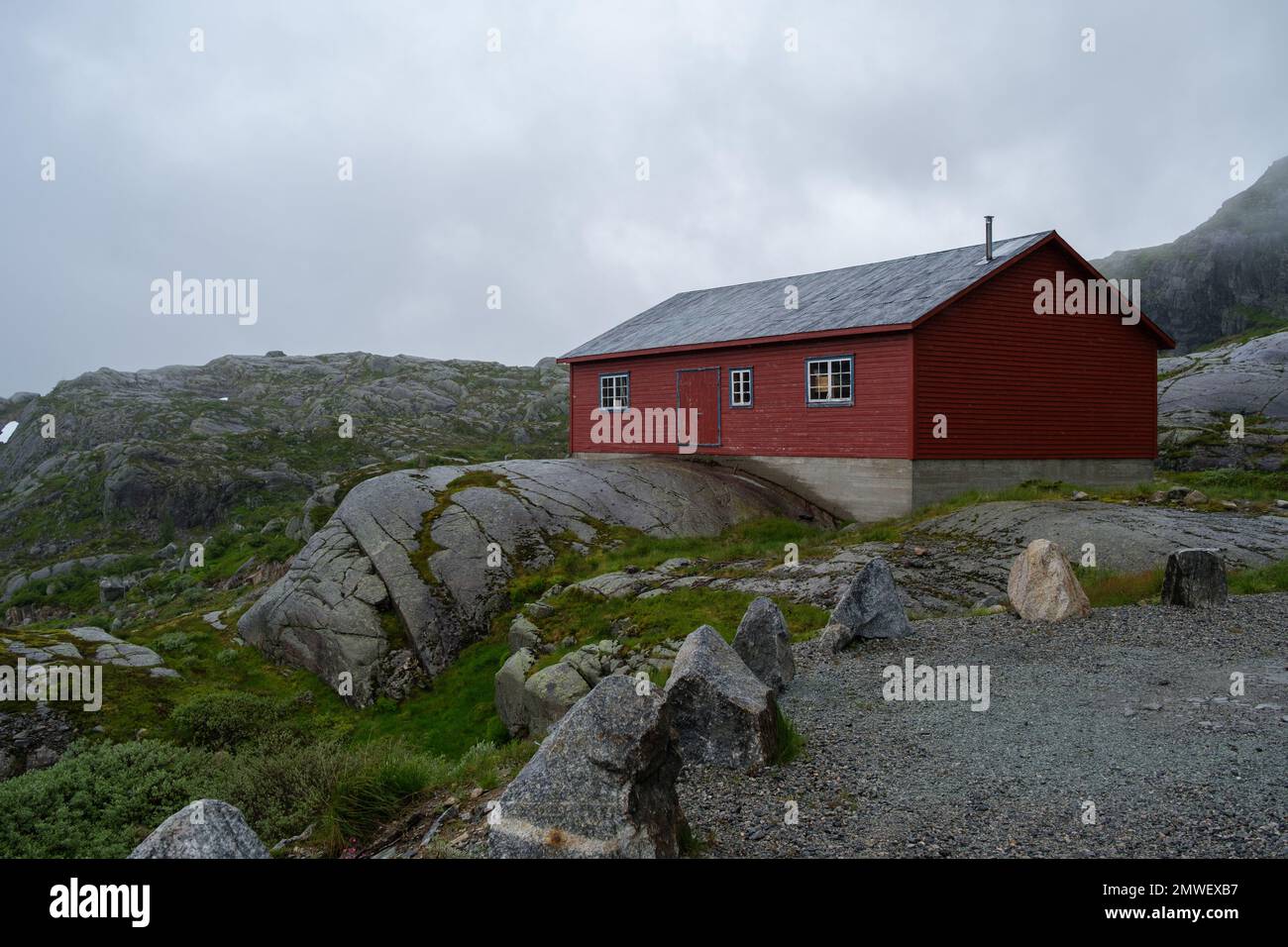 An old painted red barn on Sauda Mountain in Norway Stock Photo - Alamy