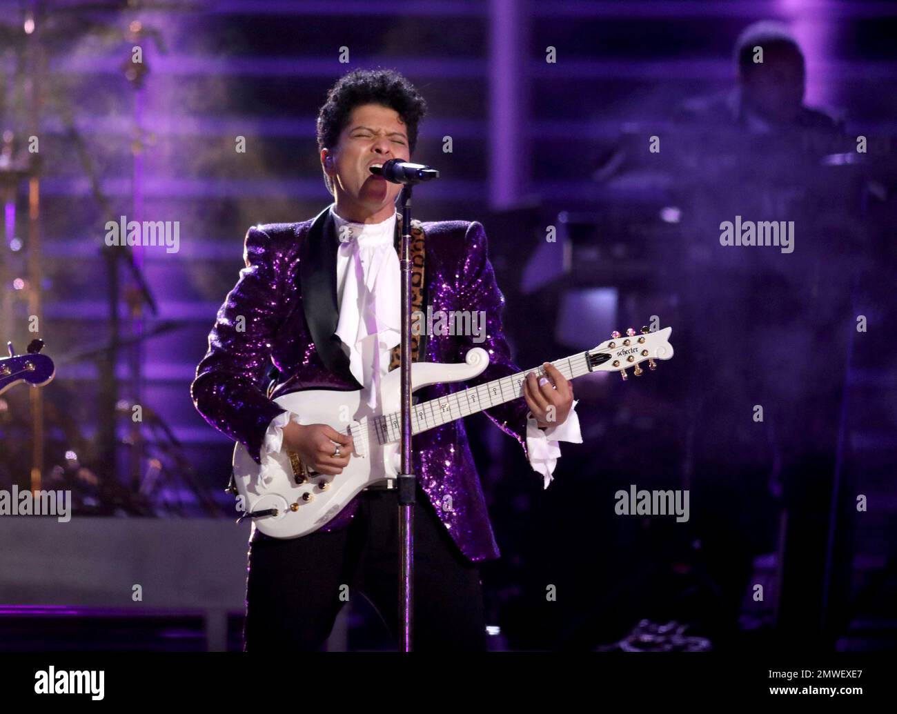 Bruno Mars performs "Let's Go Crazy" during a tribute to Prince at the ...