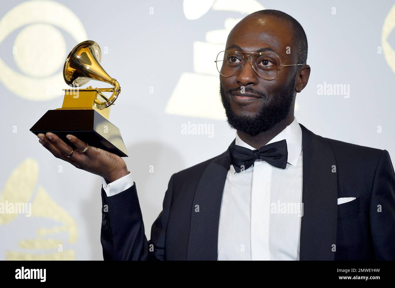 Paul Jeffries poses in the press room with the award for best rap song ...