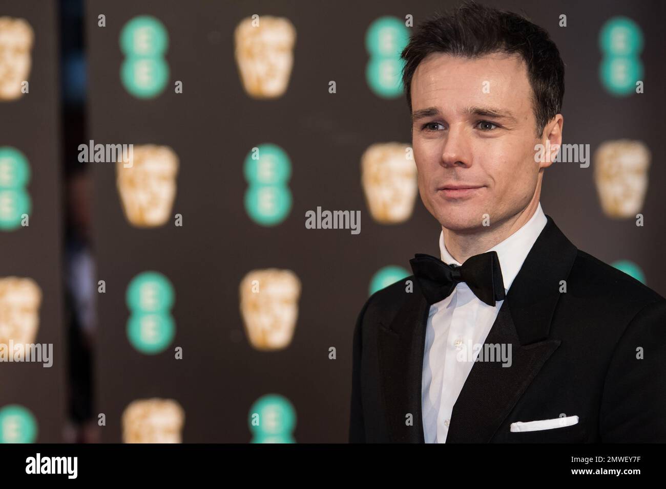 Rupert Evans poses for photographers upon arrival at the BAFTA Film ...